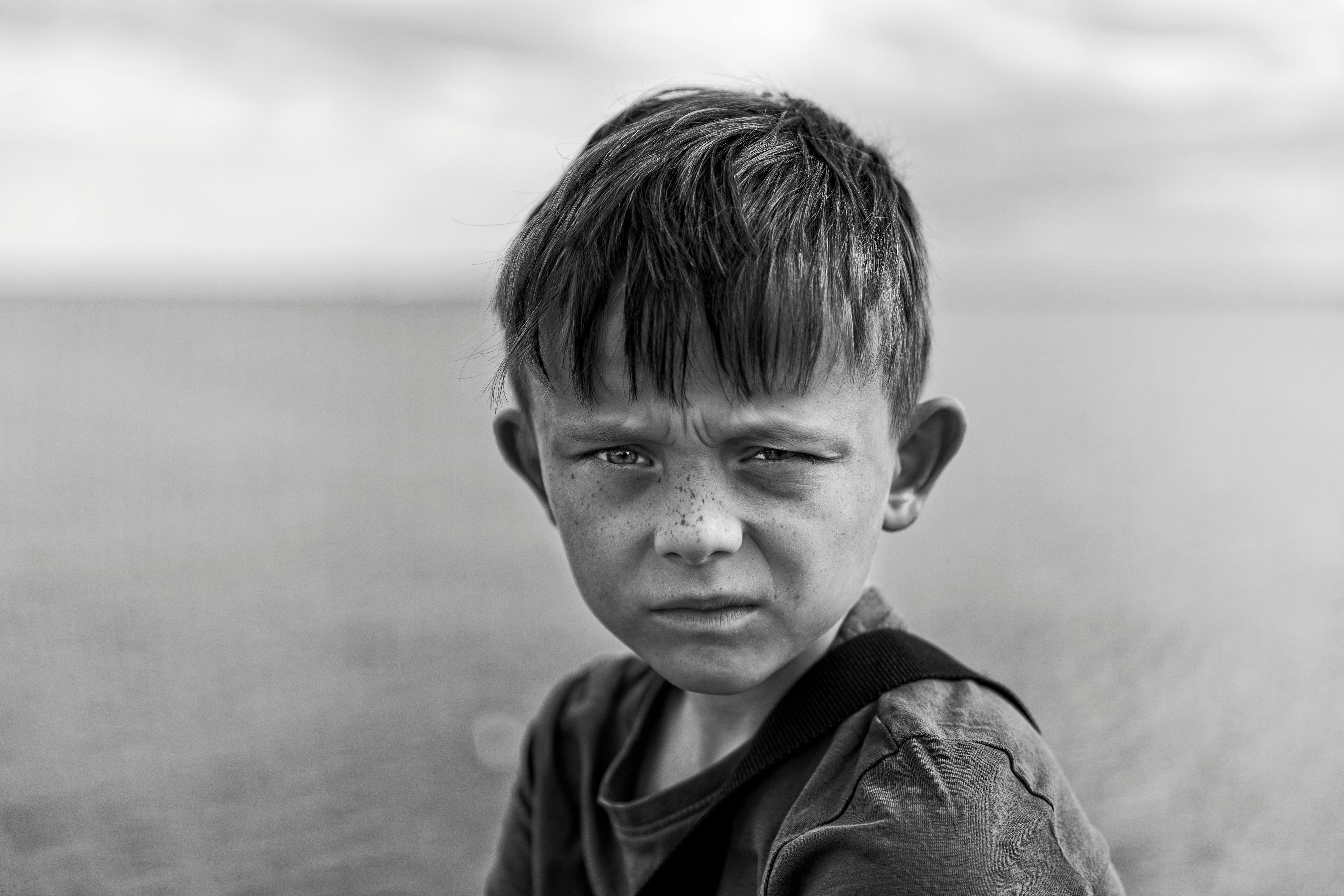 Grayscale Photo of a Boy · Free Stock Photo