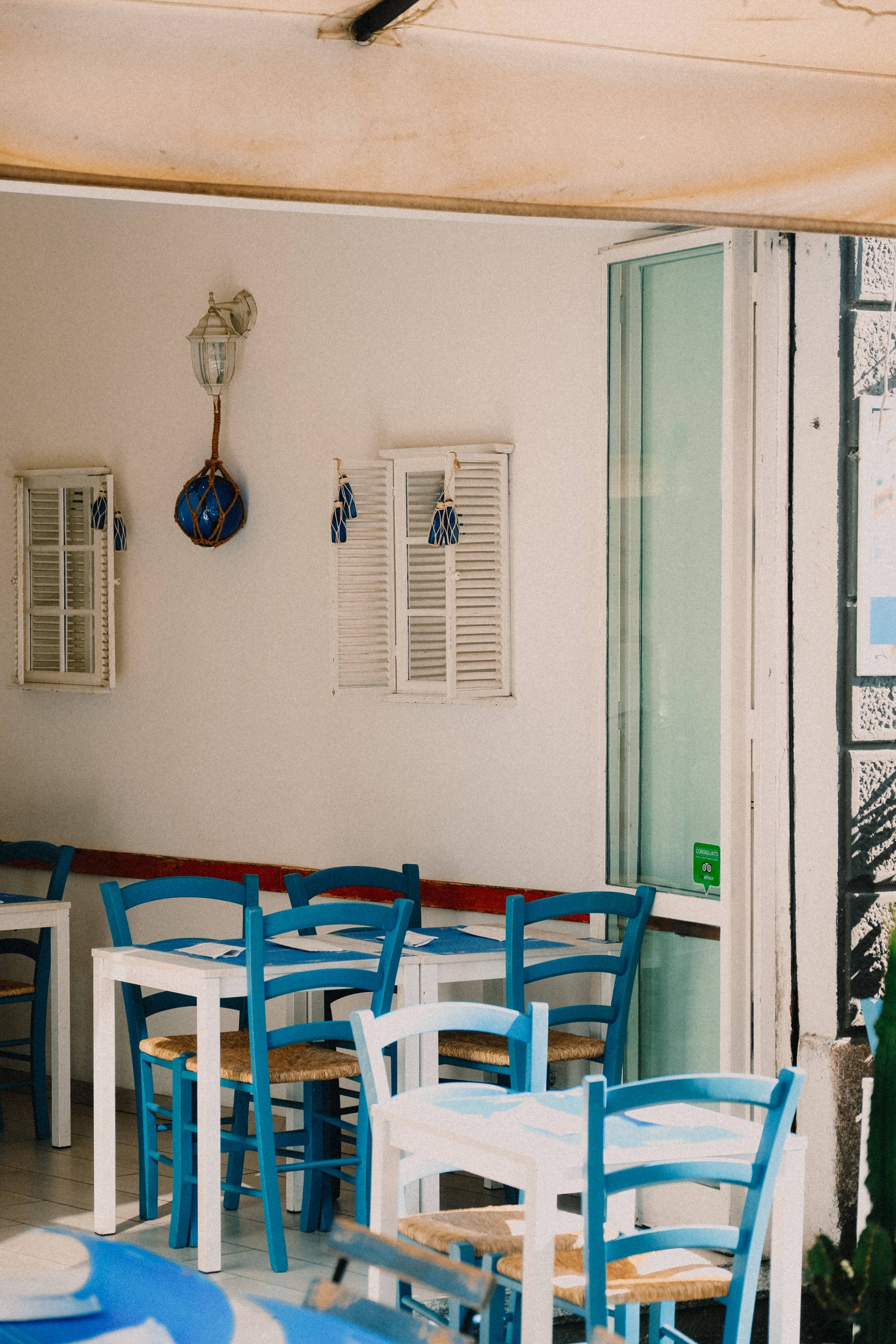 Table and Chairs Inside a Restaurant · Free Stock Photo