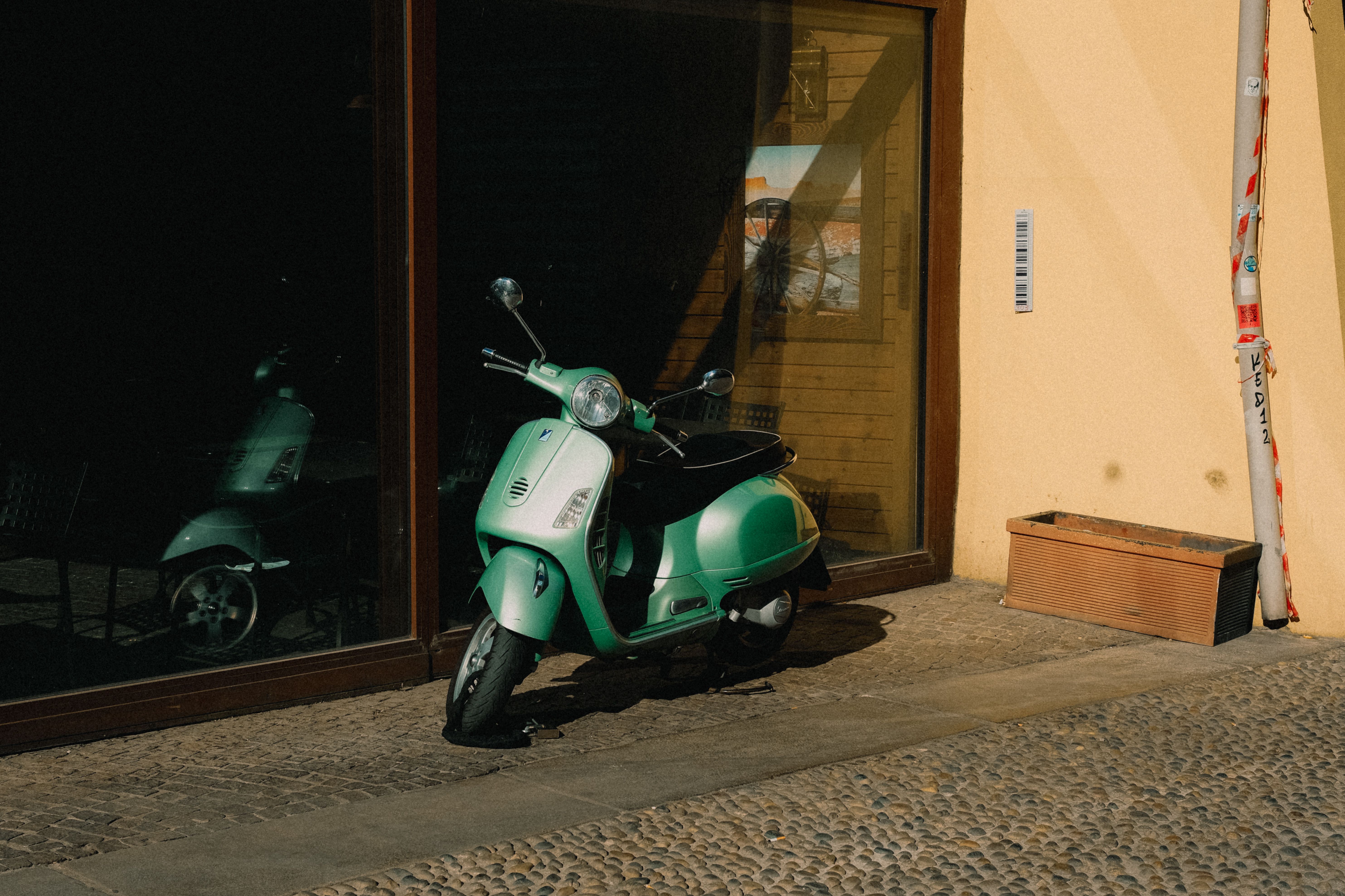 Beige Motor Scooter Parked on the Street · Free Stock Photo