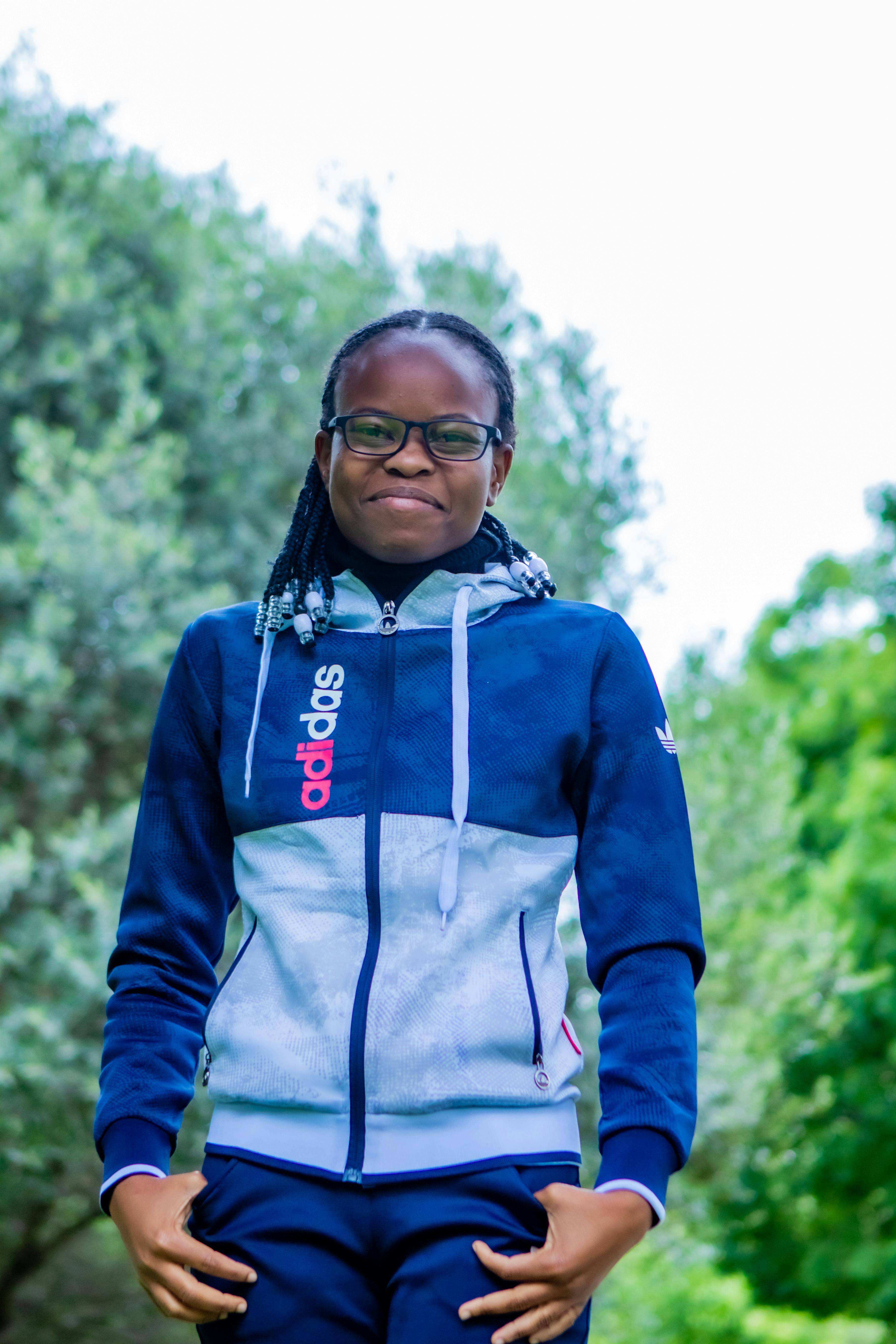 Woman Holding Rubik's Cube · Free Stock Photo