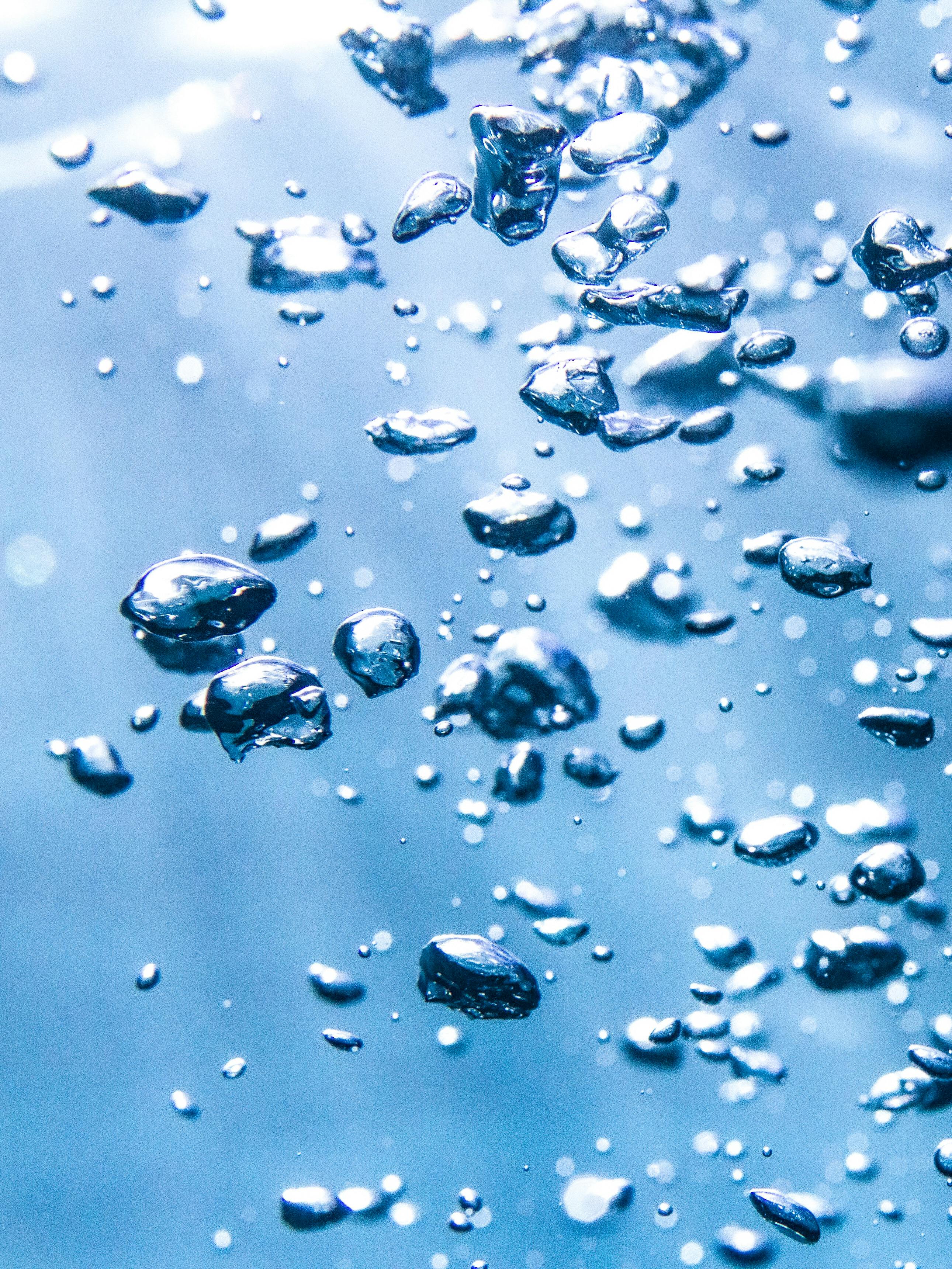 Close-Up Shot of Air Bubbles · Free Stock Photo