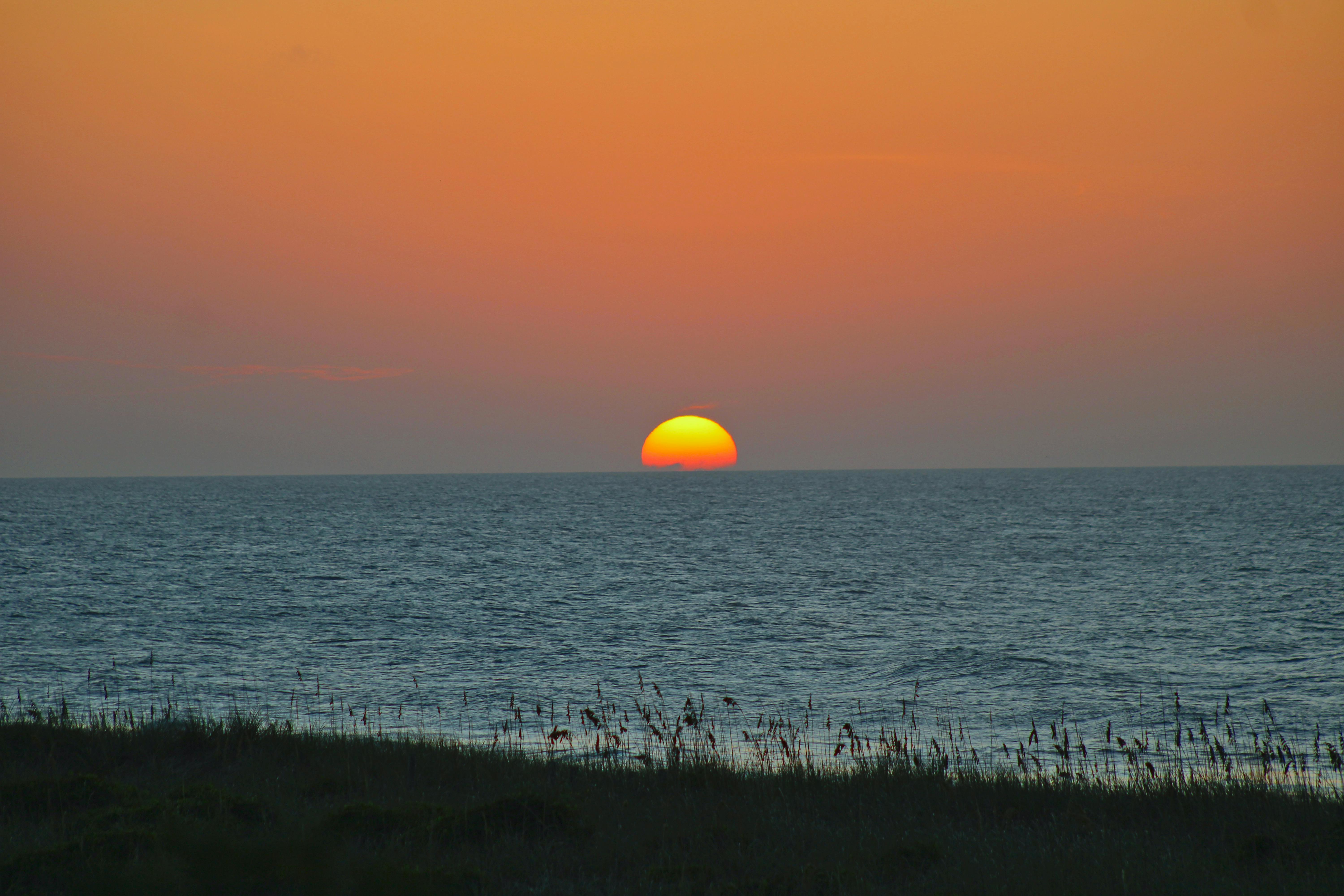 Sun Setting on the Sea · Free Stock Photo