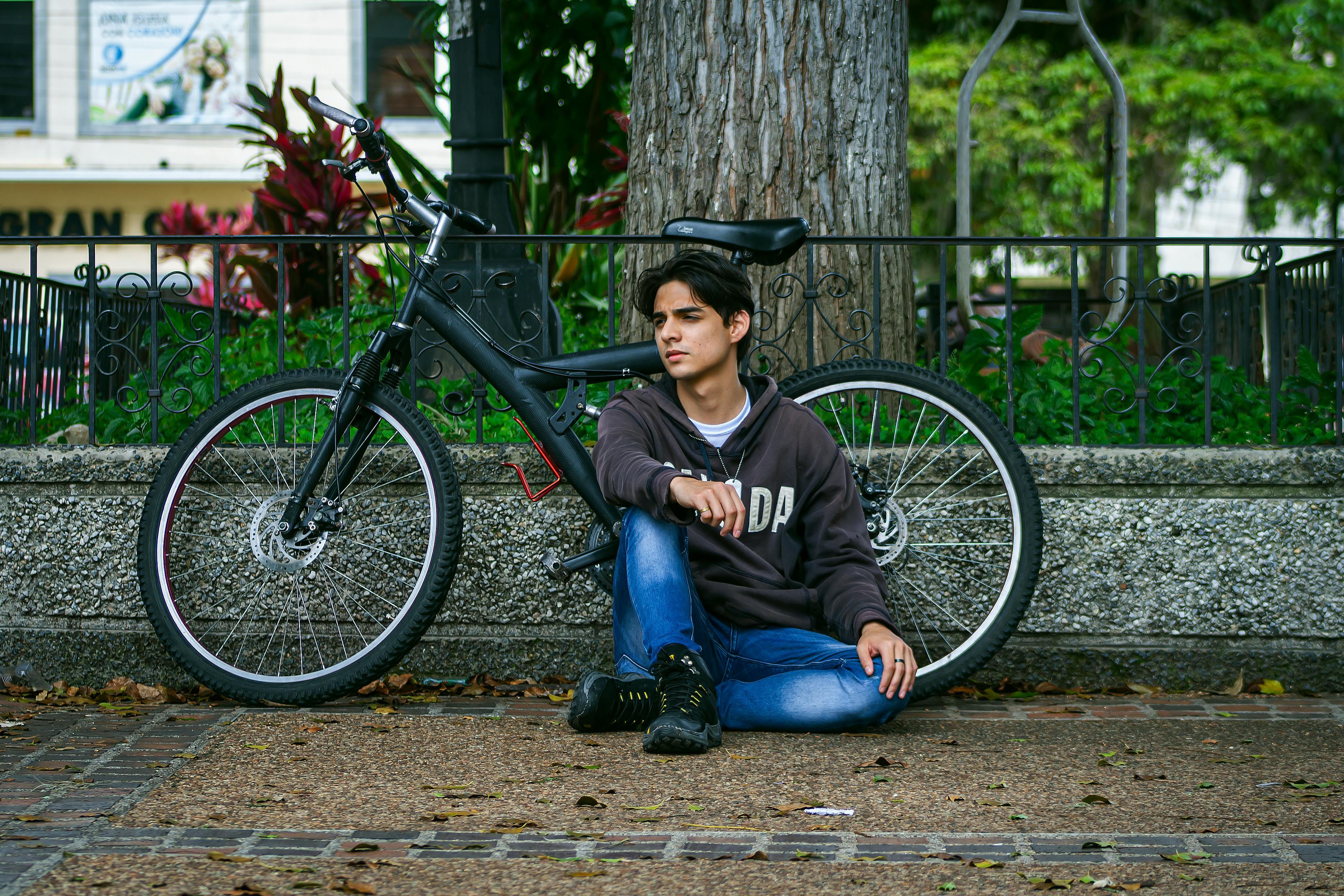 Man Sitting on the Ground · Free Stock Photo