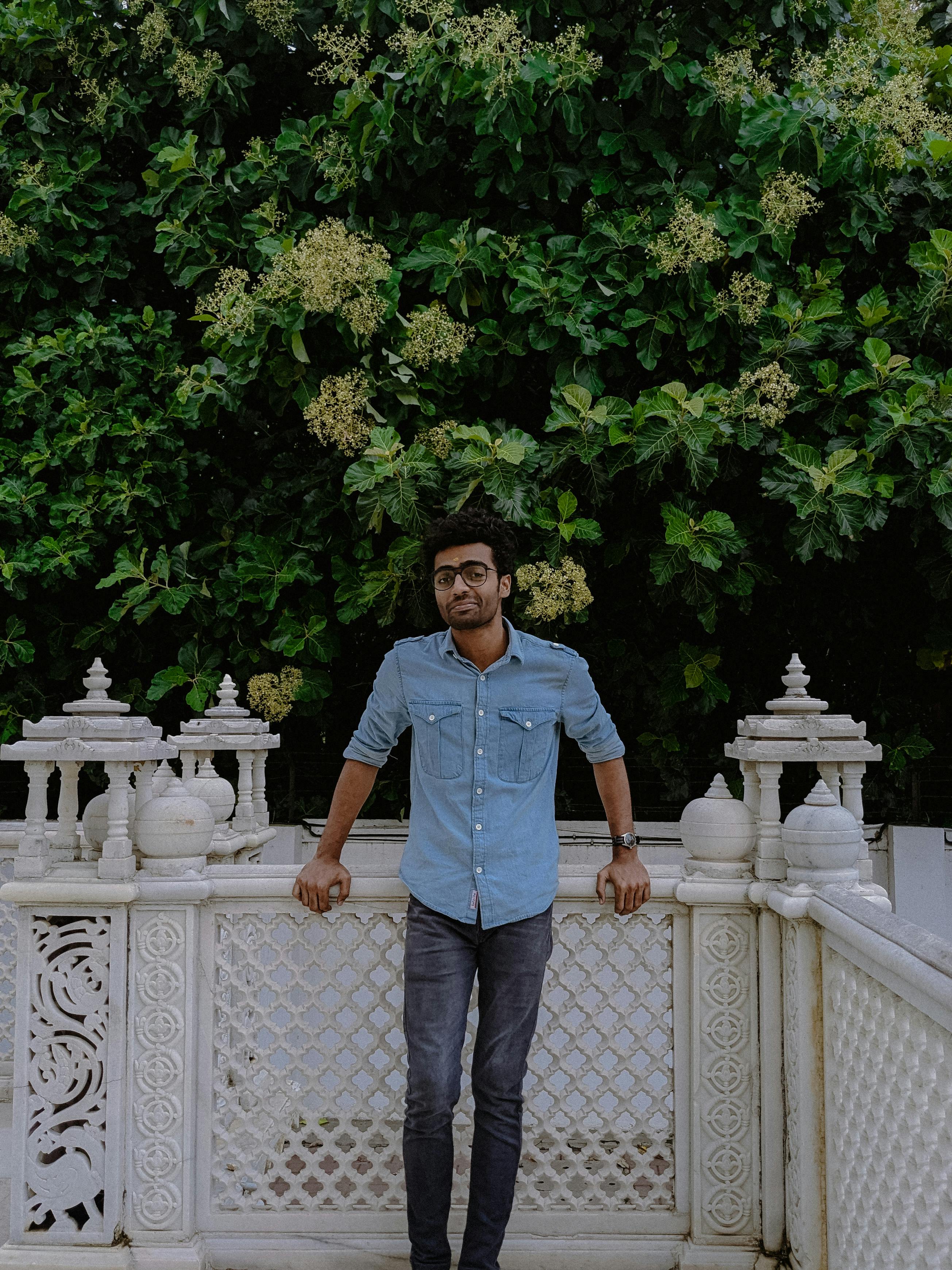 Man in a Lean Back Pose on a Street in City · Free Stock Photo