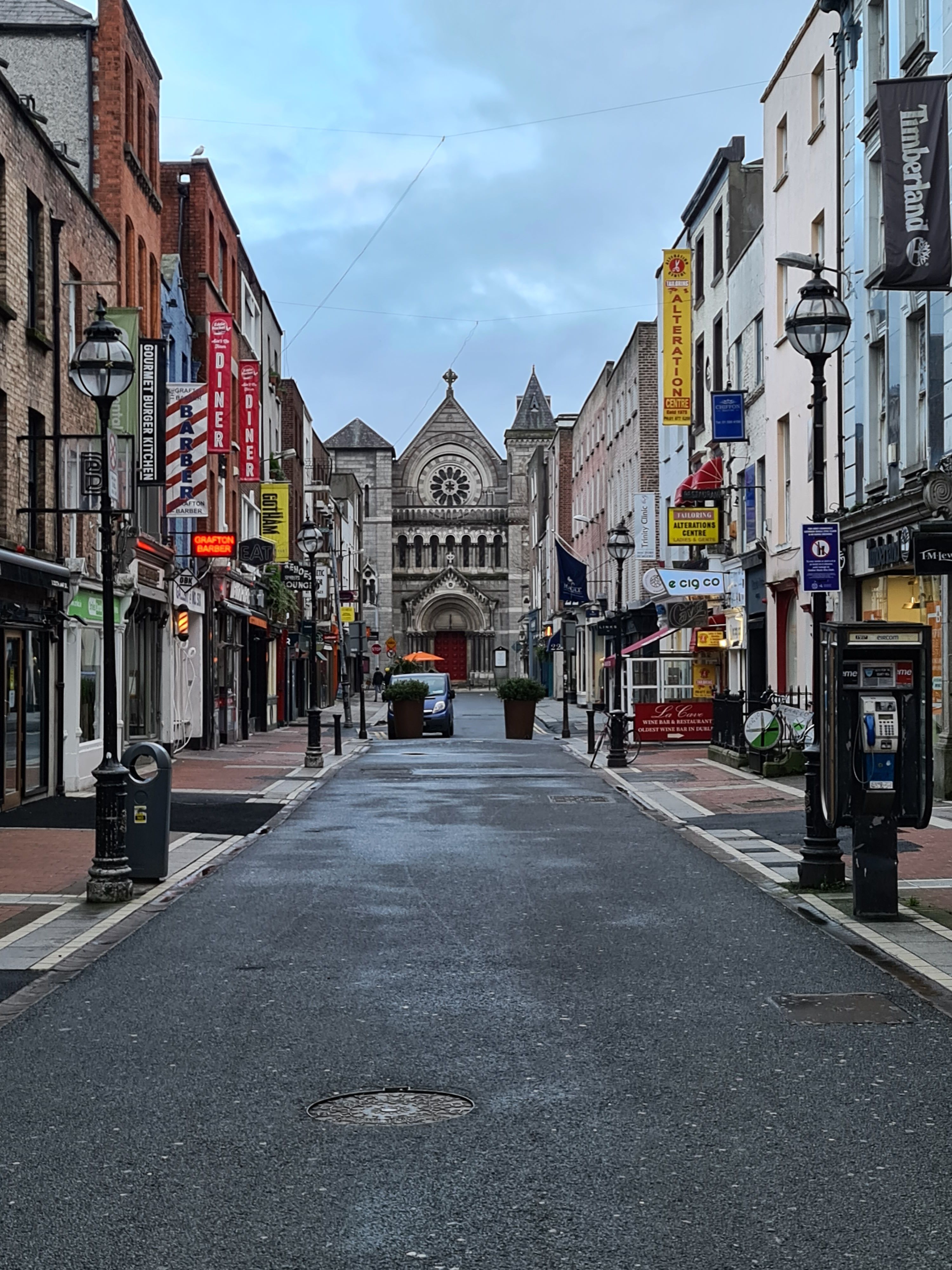 A Church in Between Buildings · Free Stock Photo