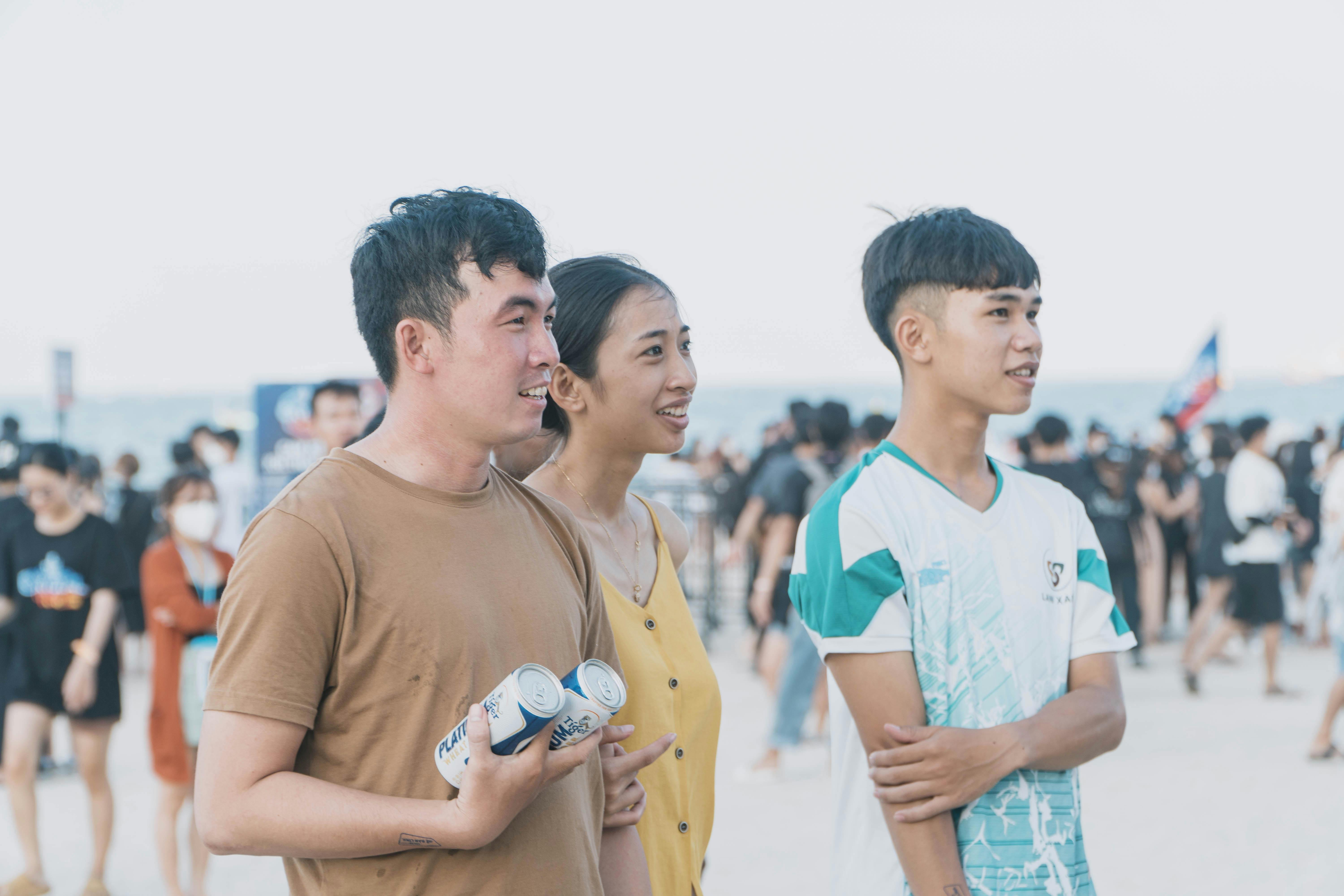 Three People Smiling Together · Free Stock Photo
