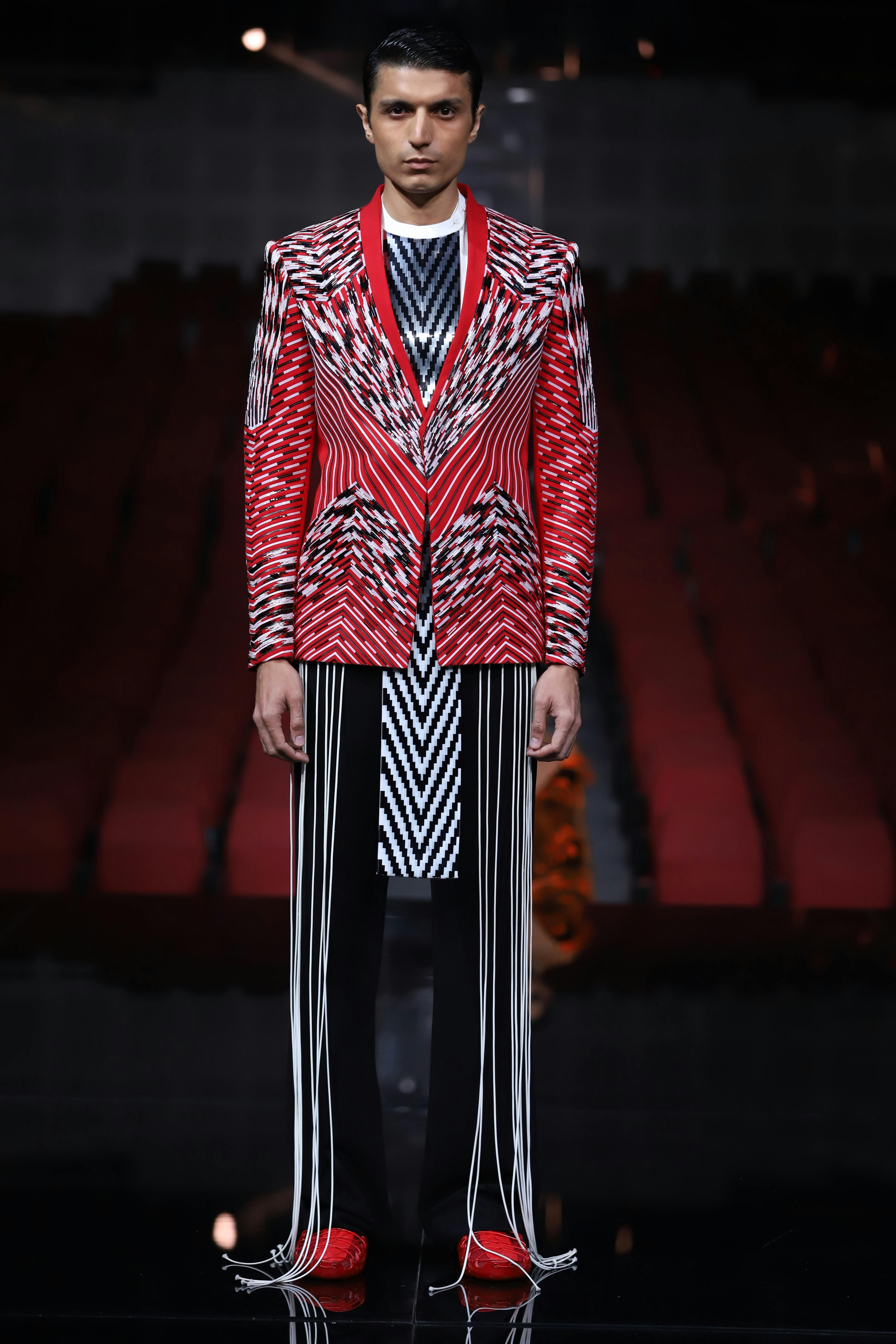 Man in Sophisticated Suit on Catwalk · Free Stock Photo