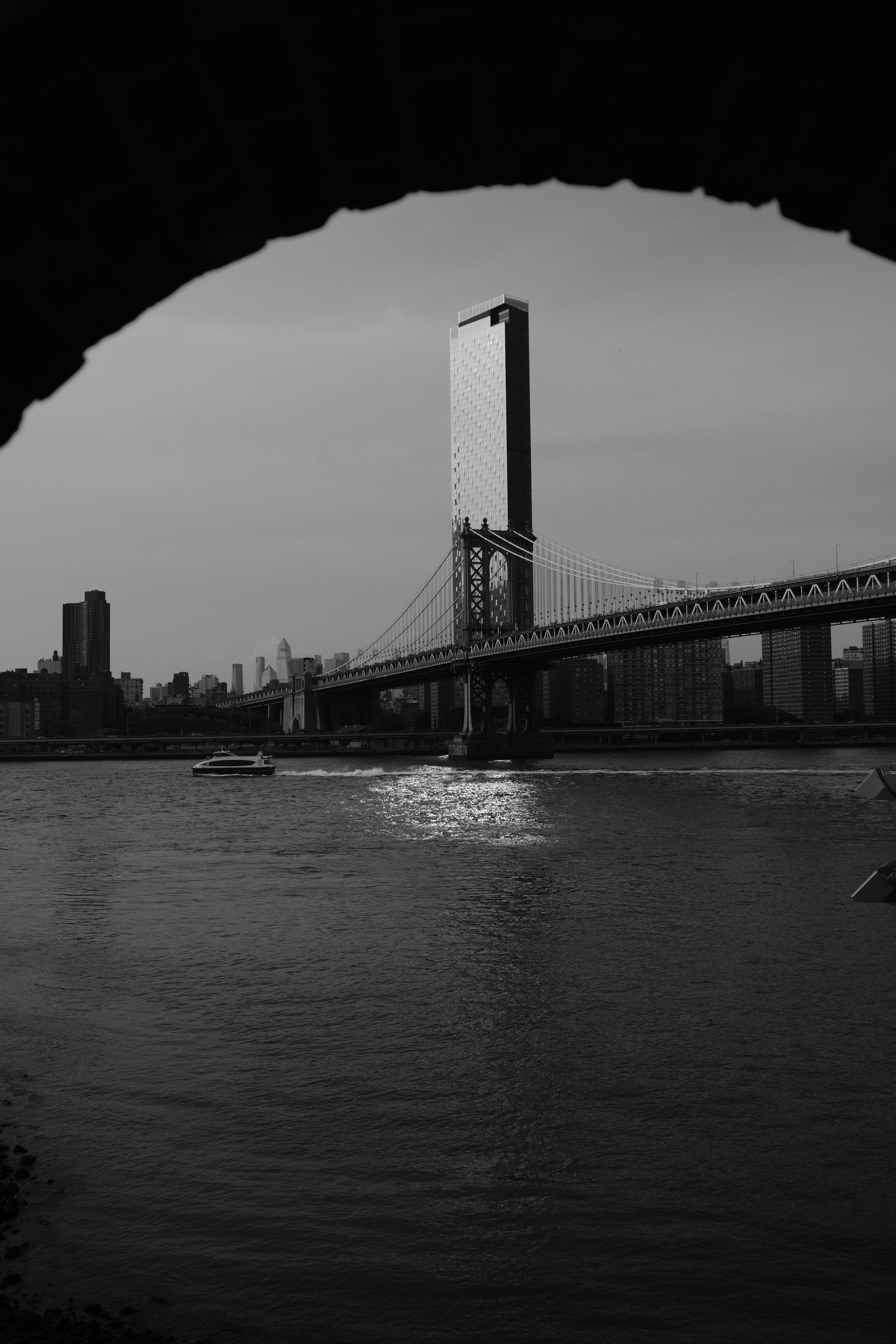 Grayscale Photo of a Bridge over the River · Free Stock Photo