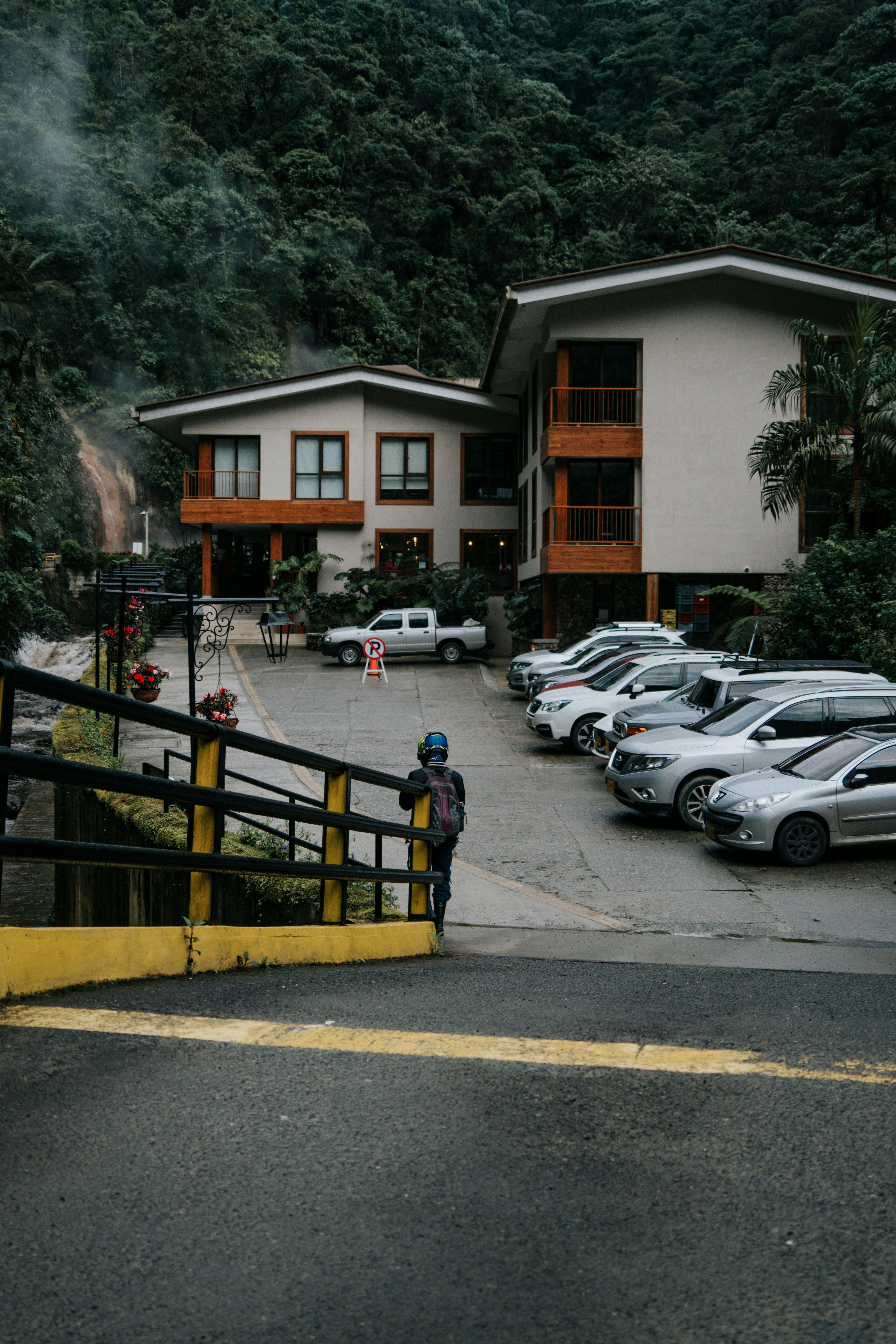 Asphalt Road Leading to a Resort Building in a Mountain Valley · Free ...
