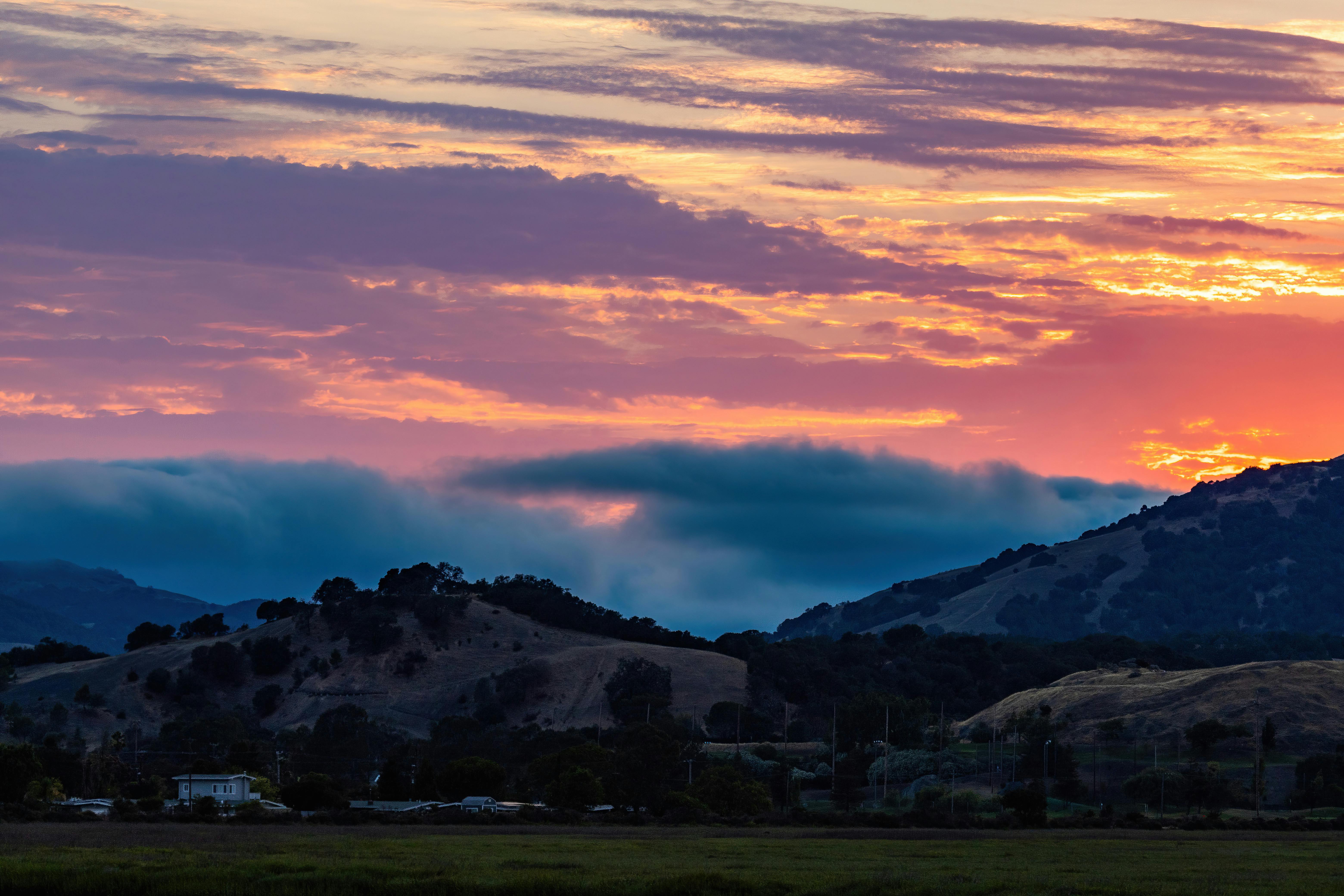 Green Grass Field in the Mountain Valley · Free Stock Photo