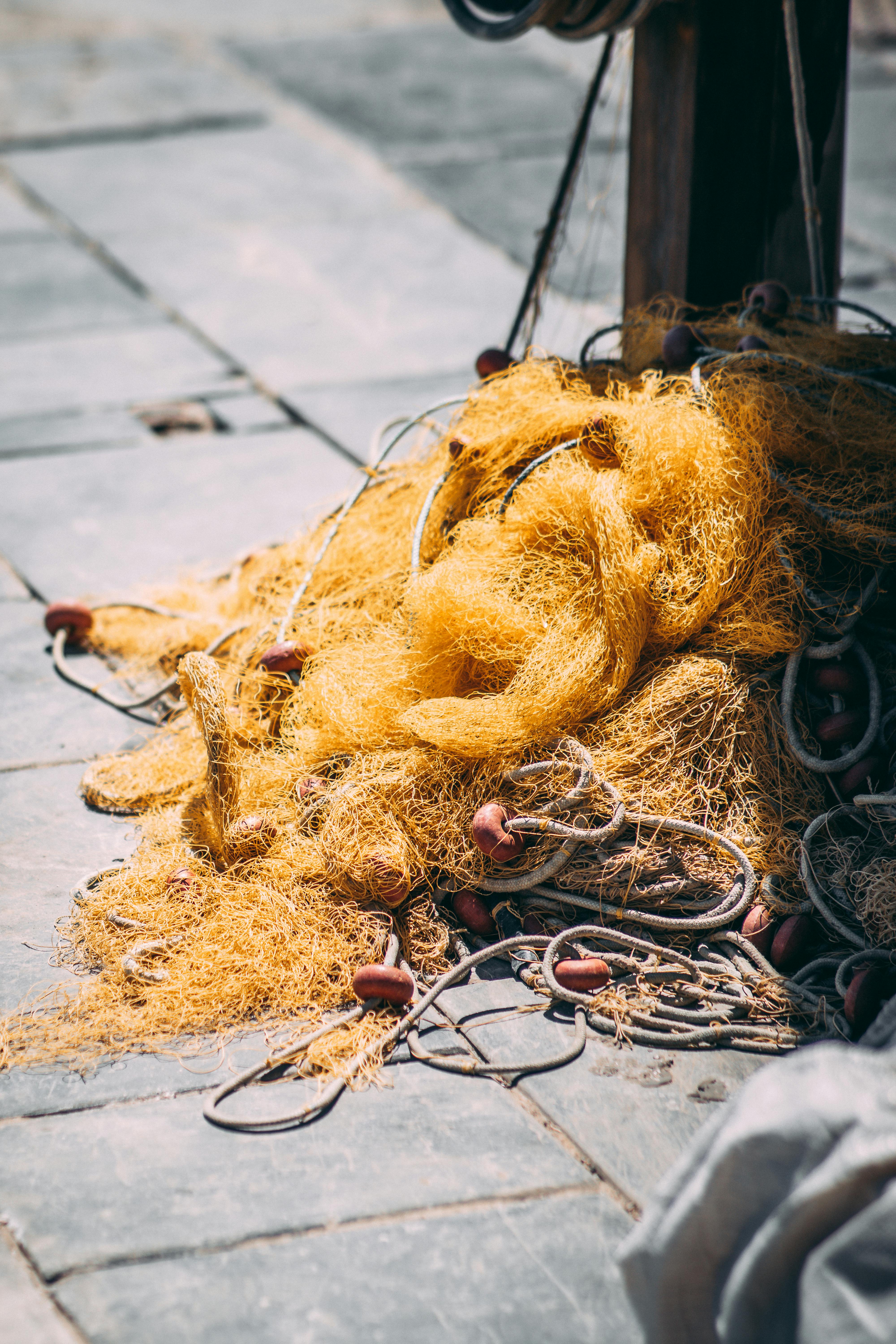 Yellow Fishnet on the Ground · Free Stock Photo