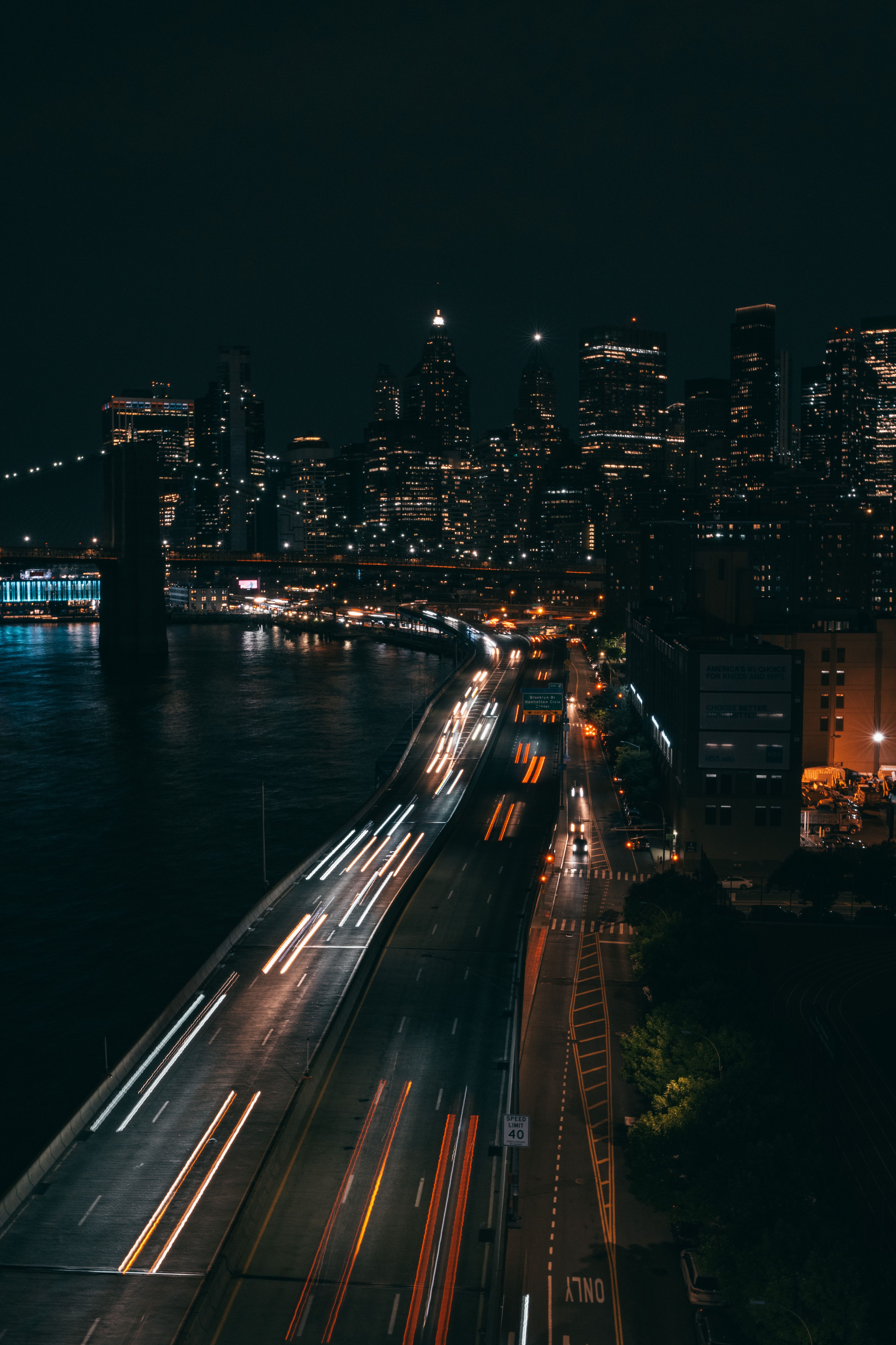 City Buildings During Night Time · Free Stock Photo