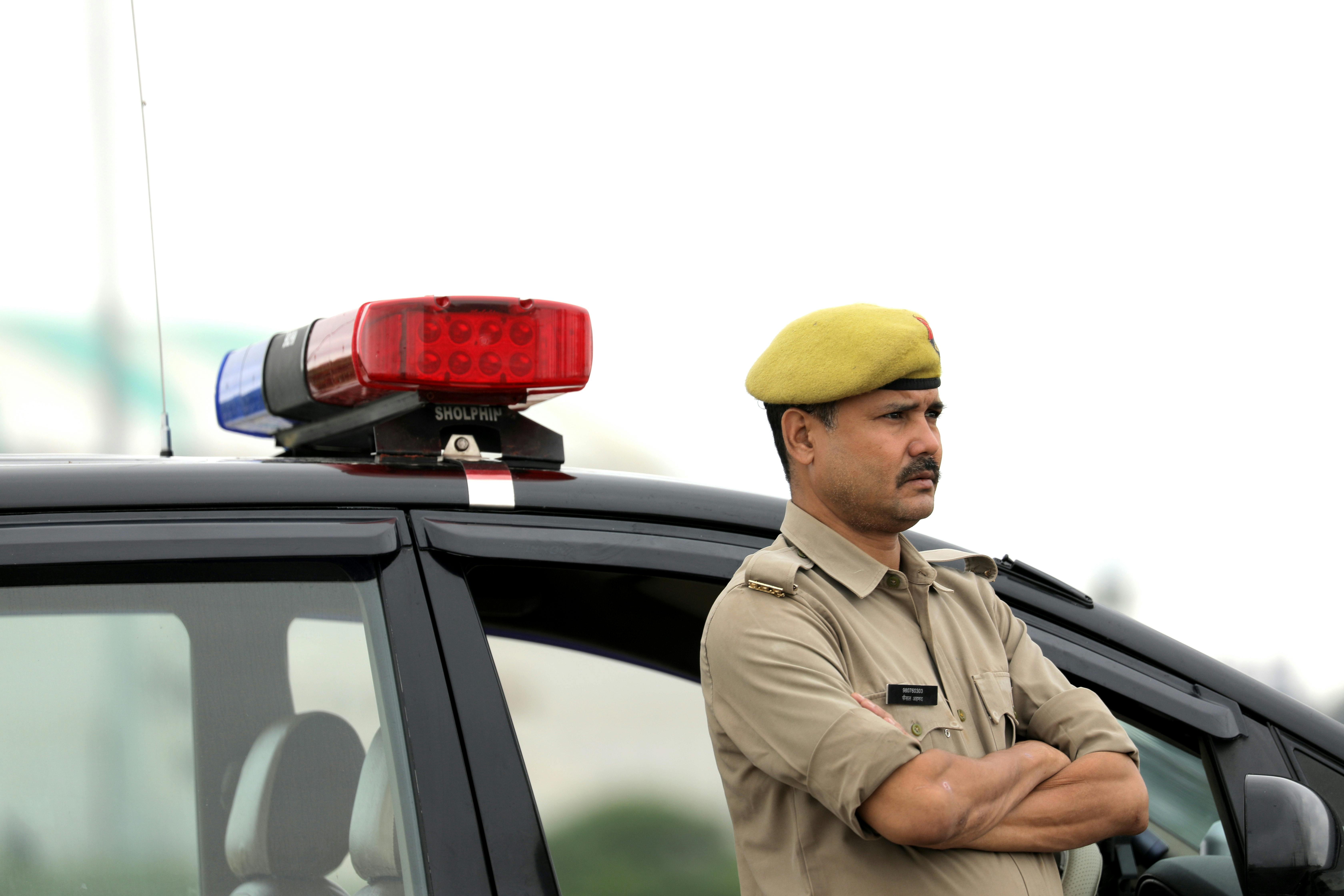 Police Officer at a Police Station · Free Stock Photo