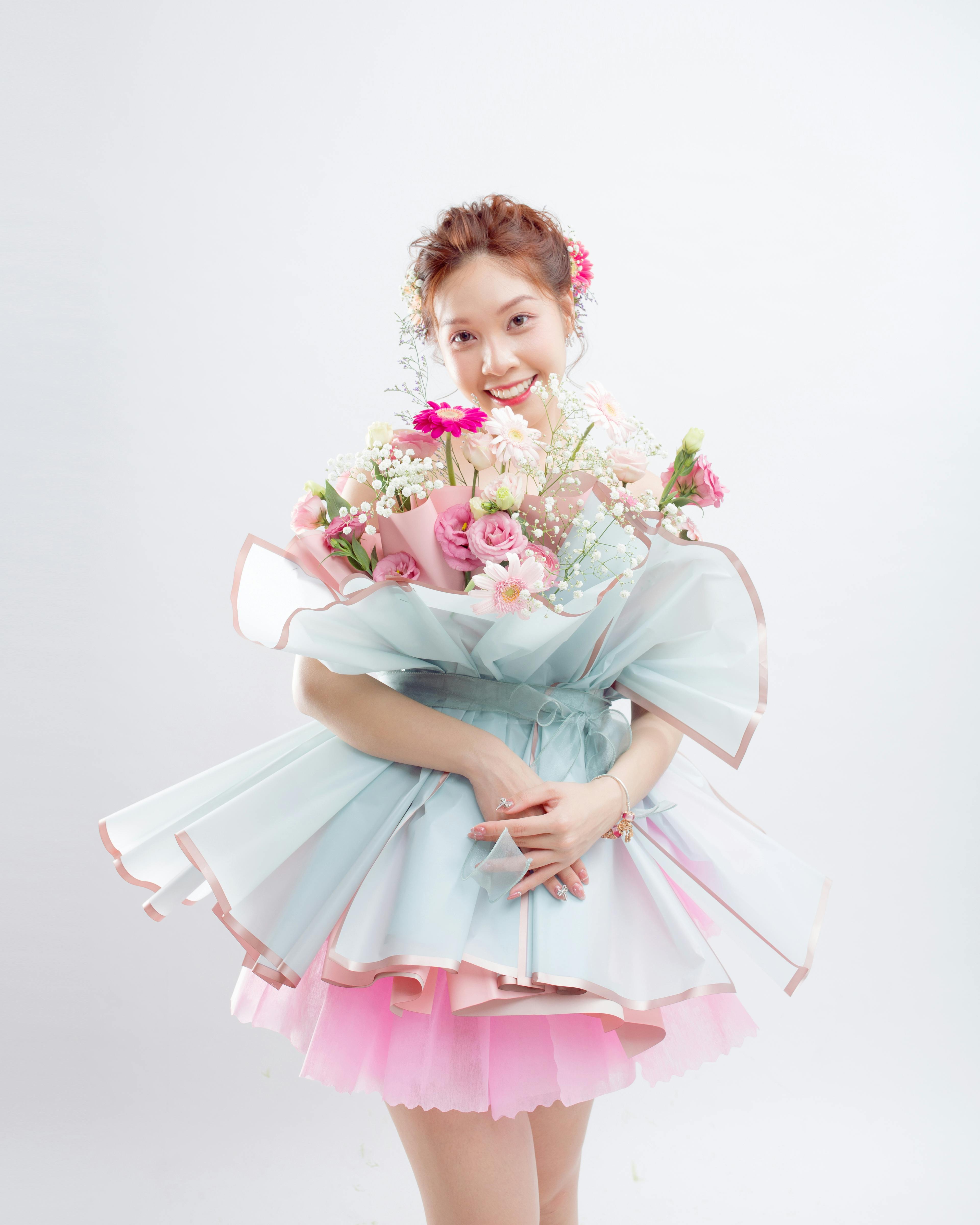 Women in Pastel Color Outfit Playing Together while Holding Each Others ...