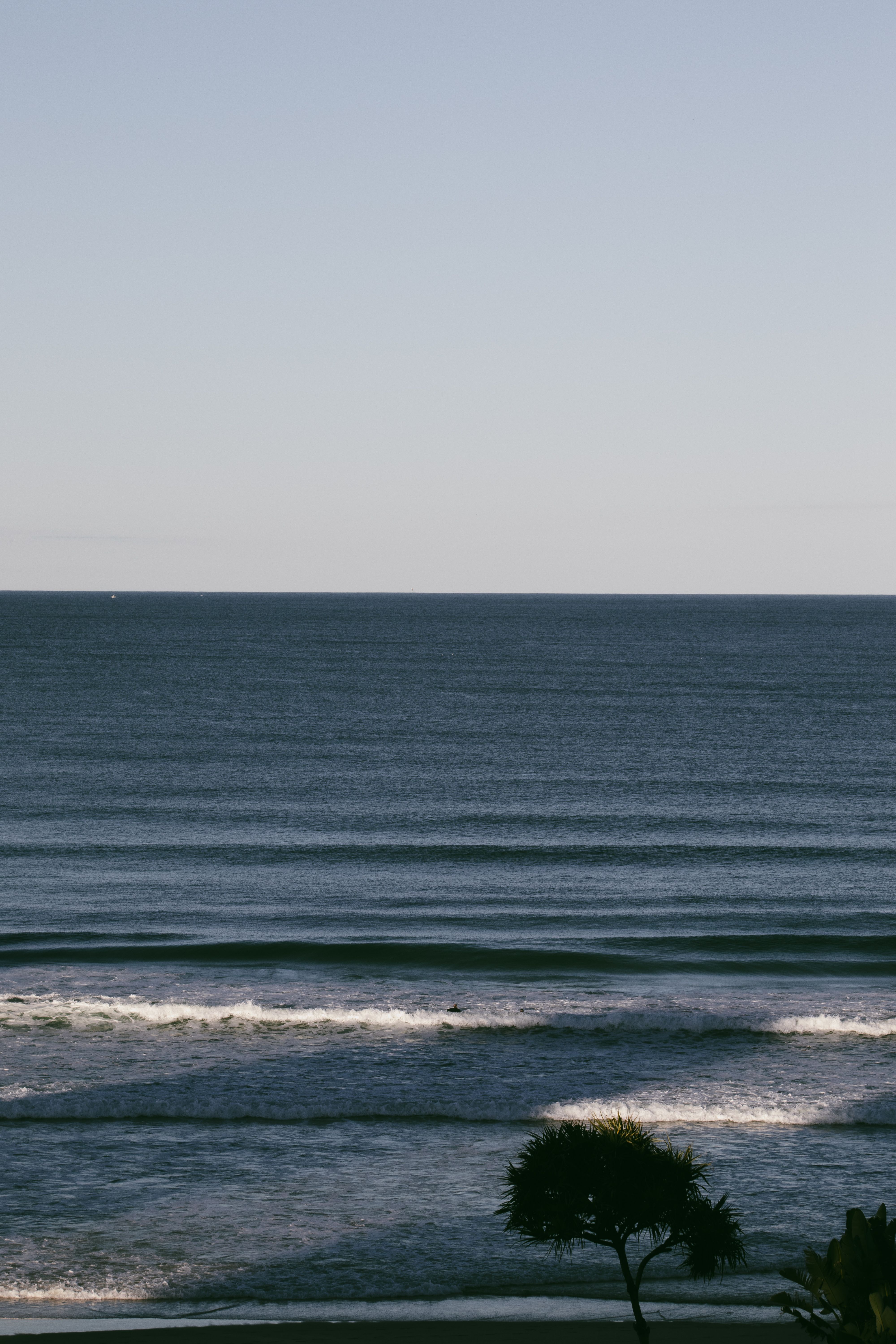 Ocean View Under Gray Sky · Free Stock Photo