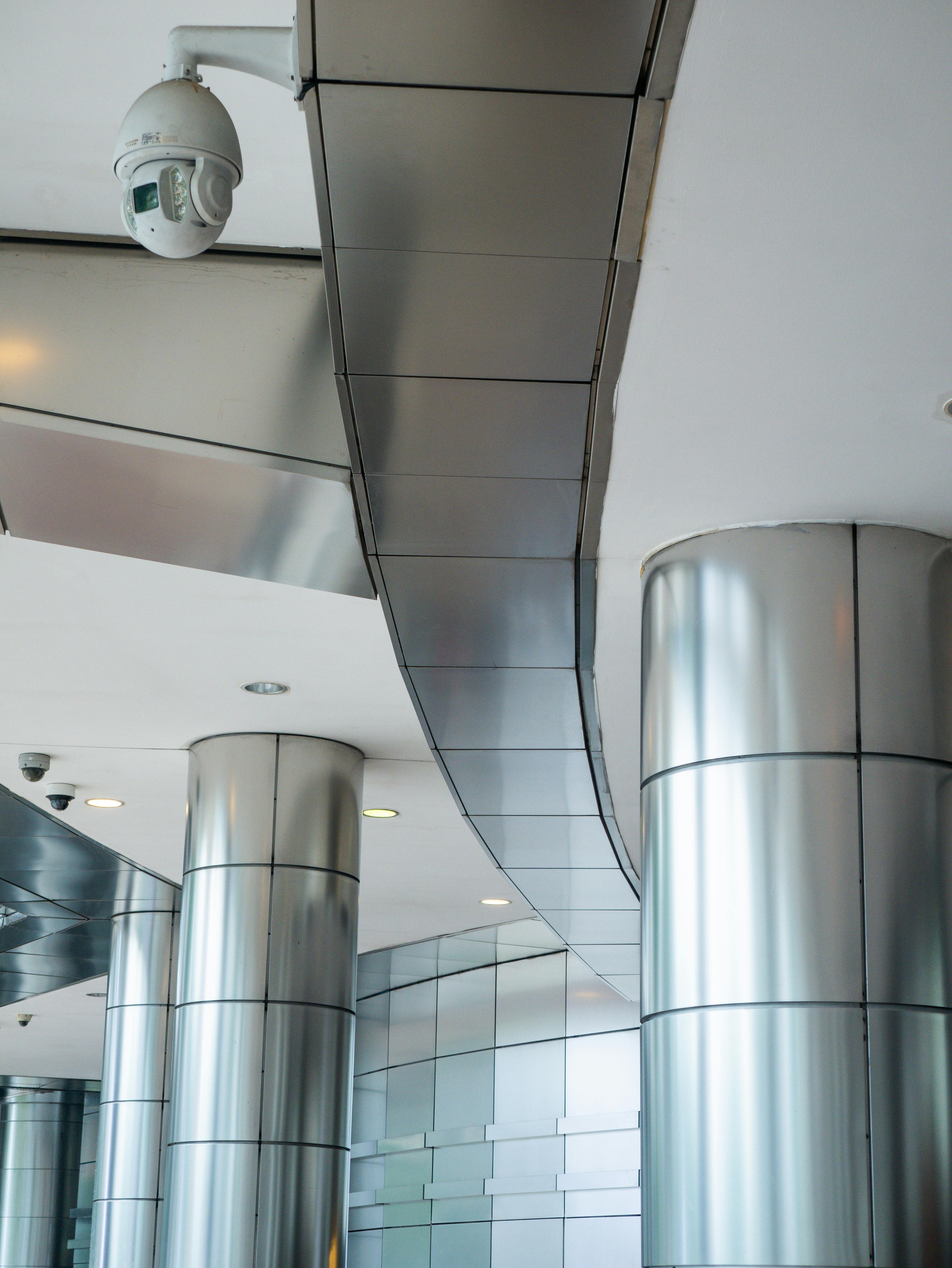 Stainless Steel Pillars of the Building · Free Stock Photo
