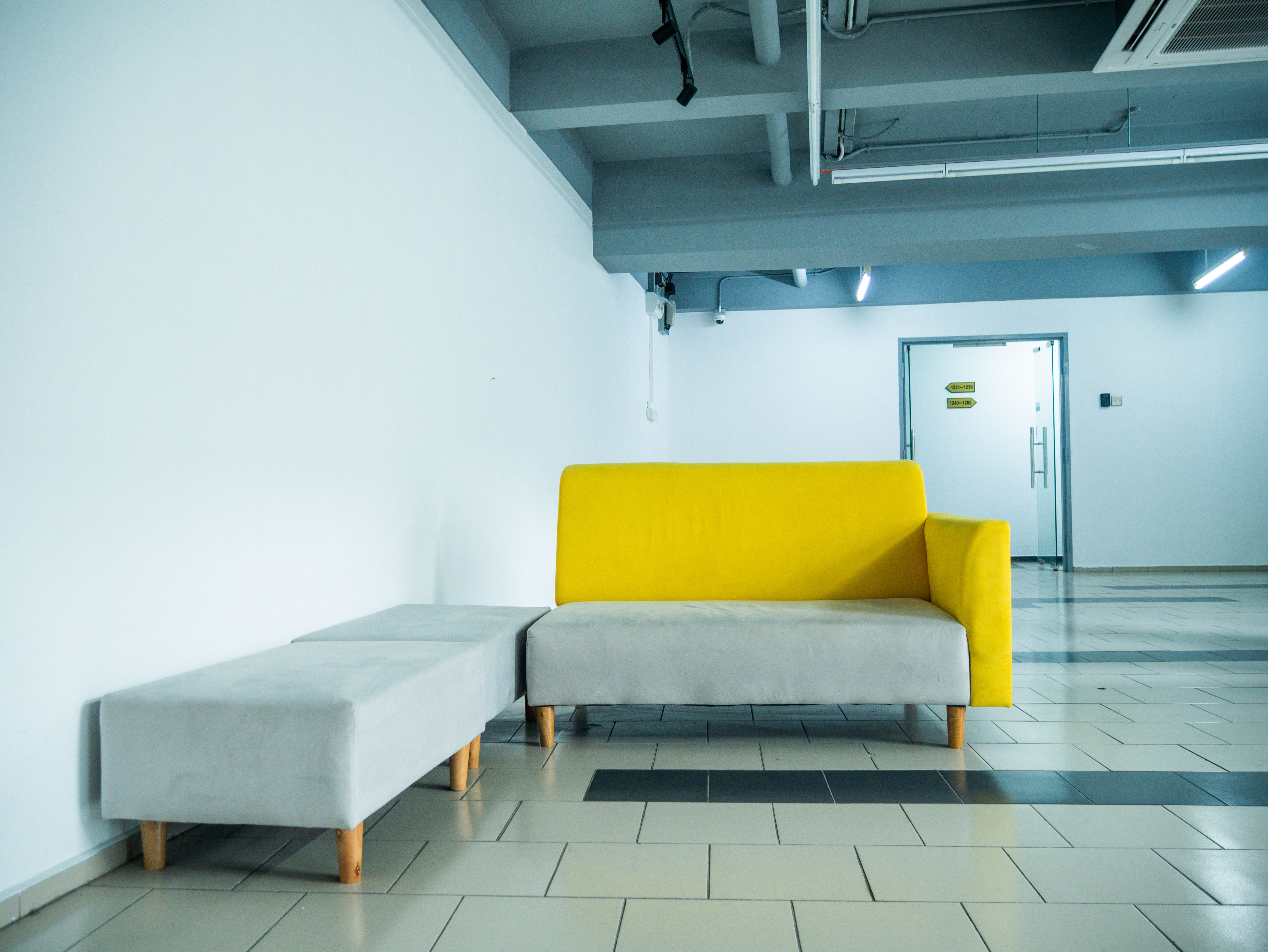 White Wall, Table and Couch · Free Stock Photo