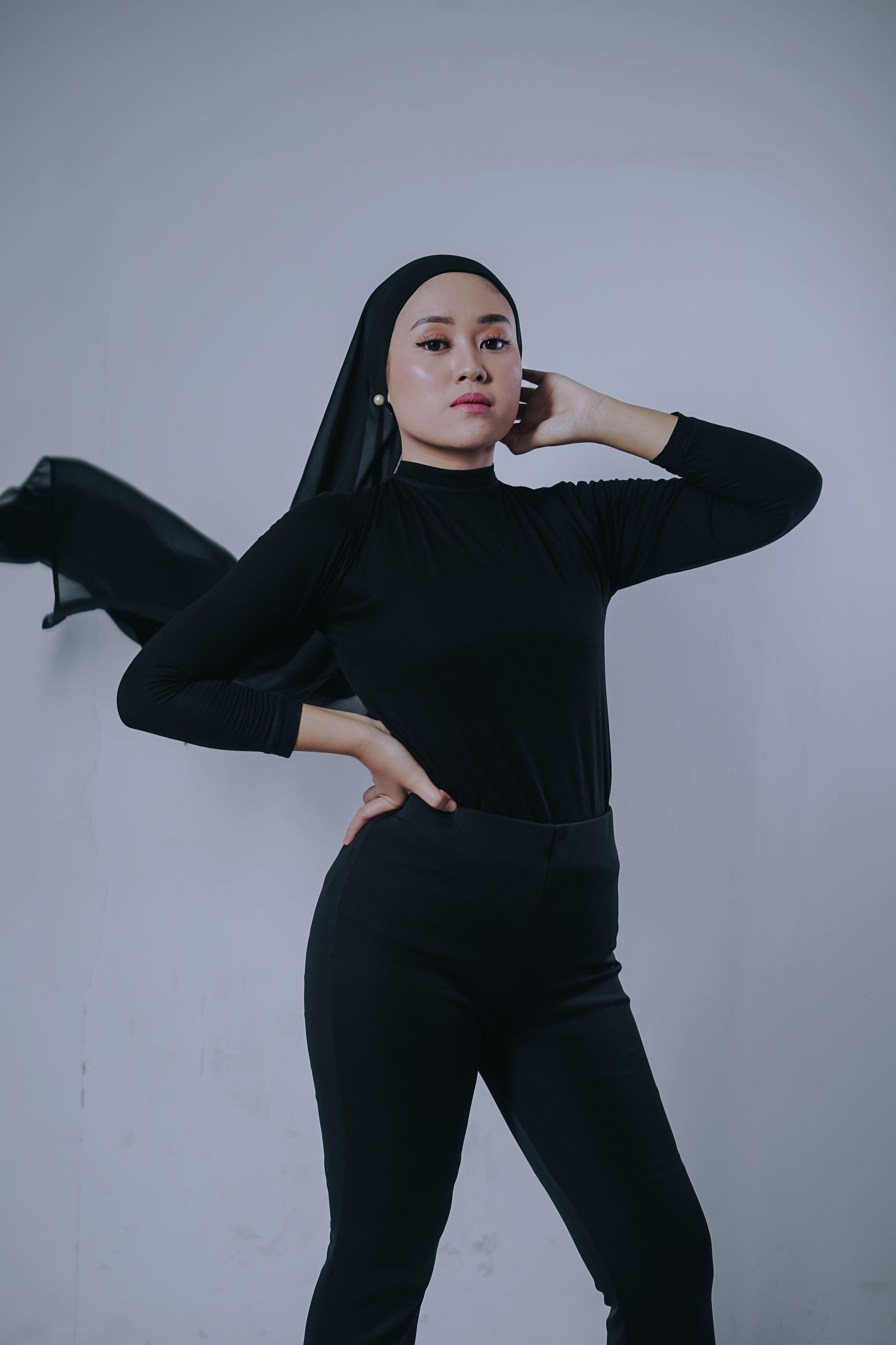 Young Model in Black Hijab Headscarf Sitting on the Floor of Parking ...