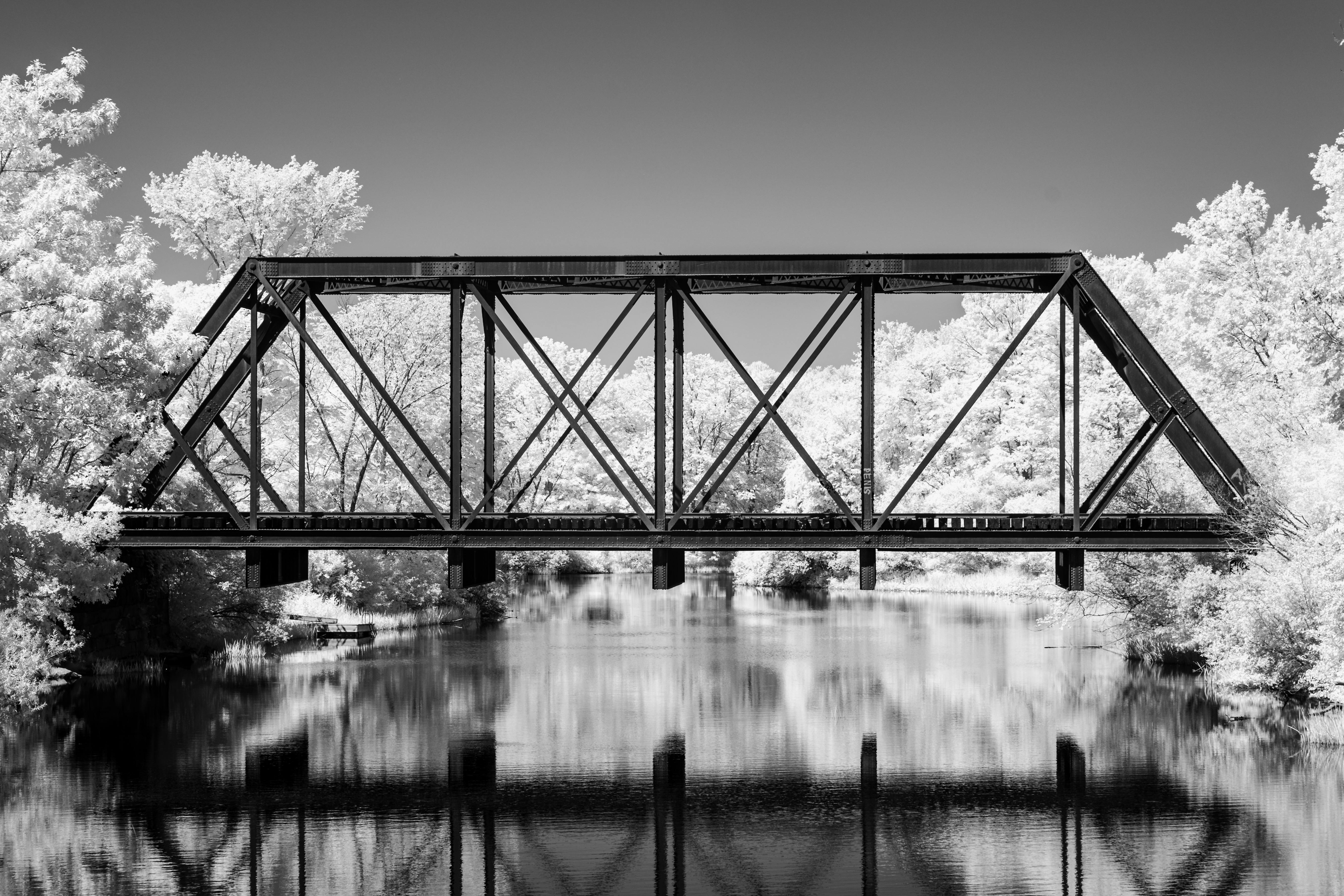 Grayscale Photo of a Bridge · Free Stock Photo