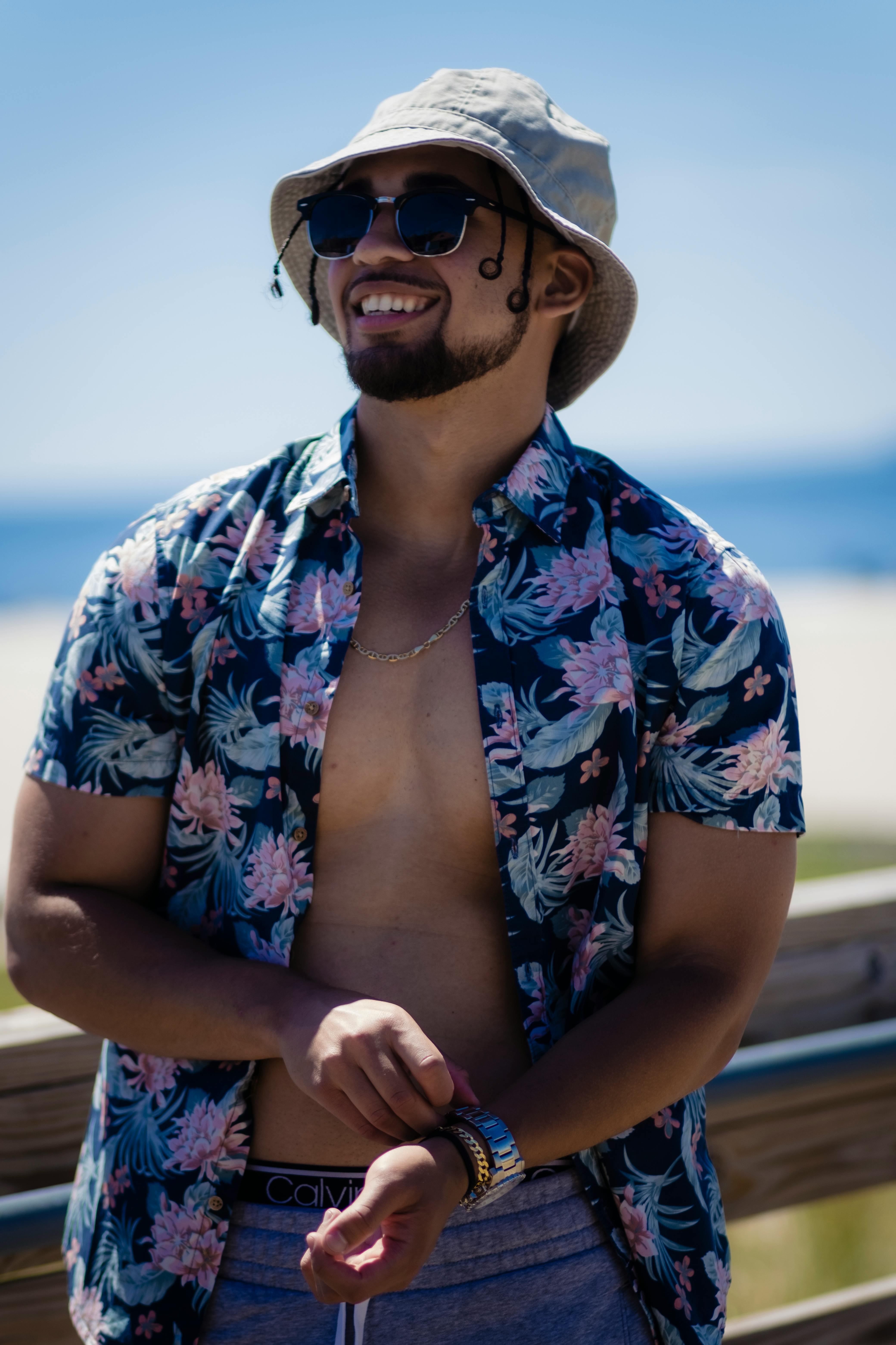 Man in Unbutton Blue Polo Wearing Black Sunglasses · Free Stock Photo