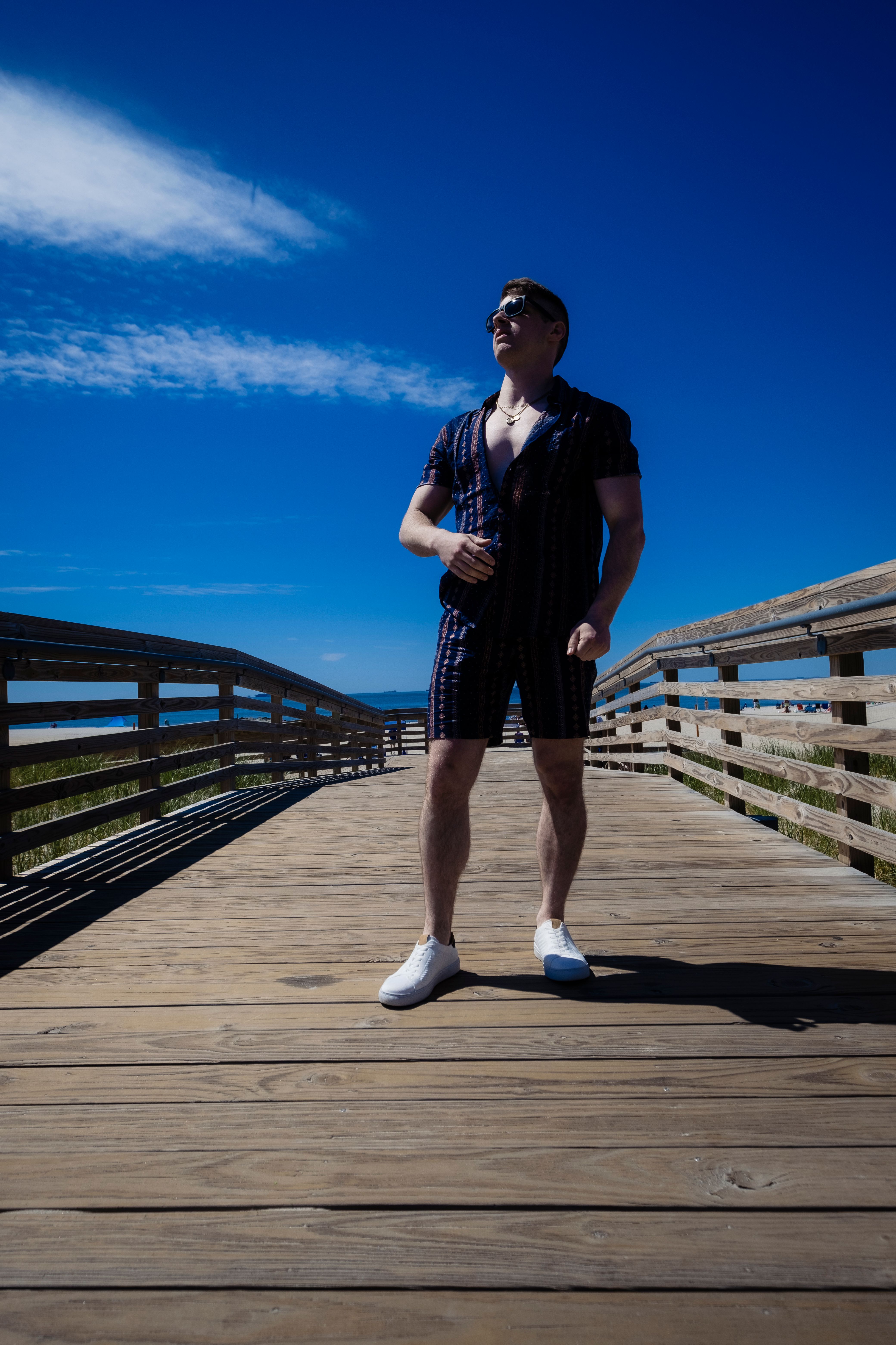 A Man on a Wooden Boardwalk · Free Stock Photo