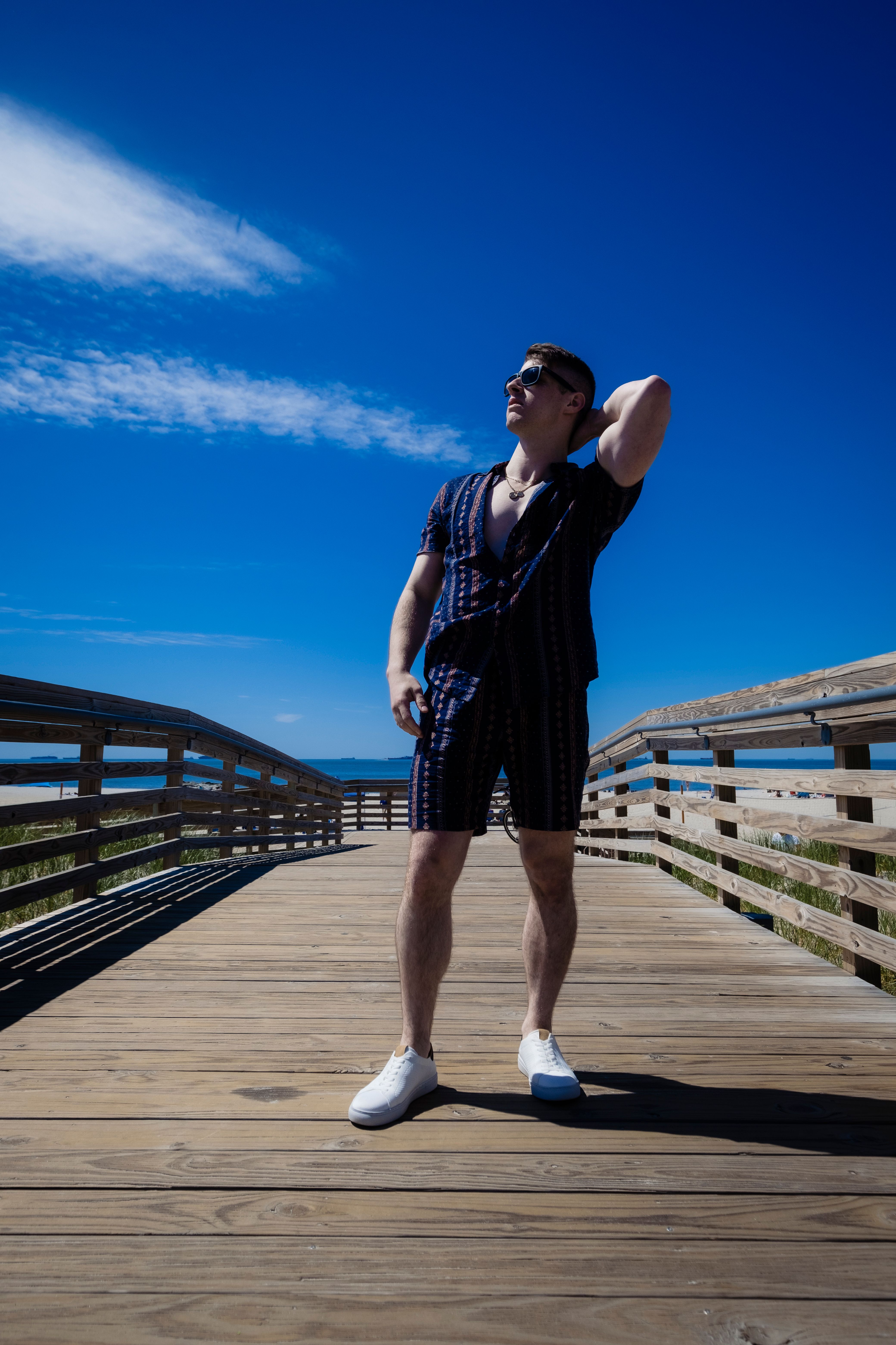 A Man on a Wooden Boardwalk · Free Stock Photo