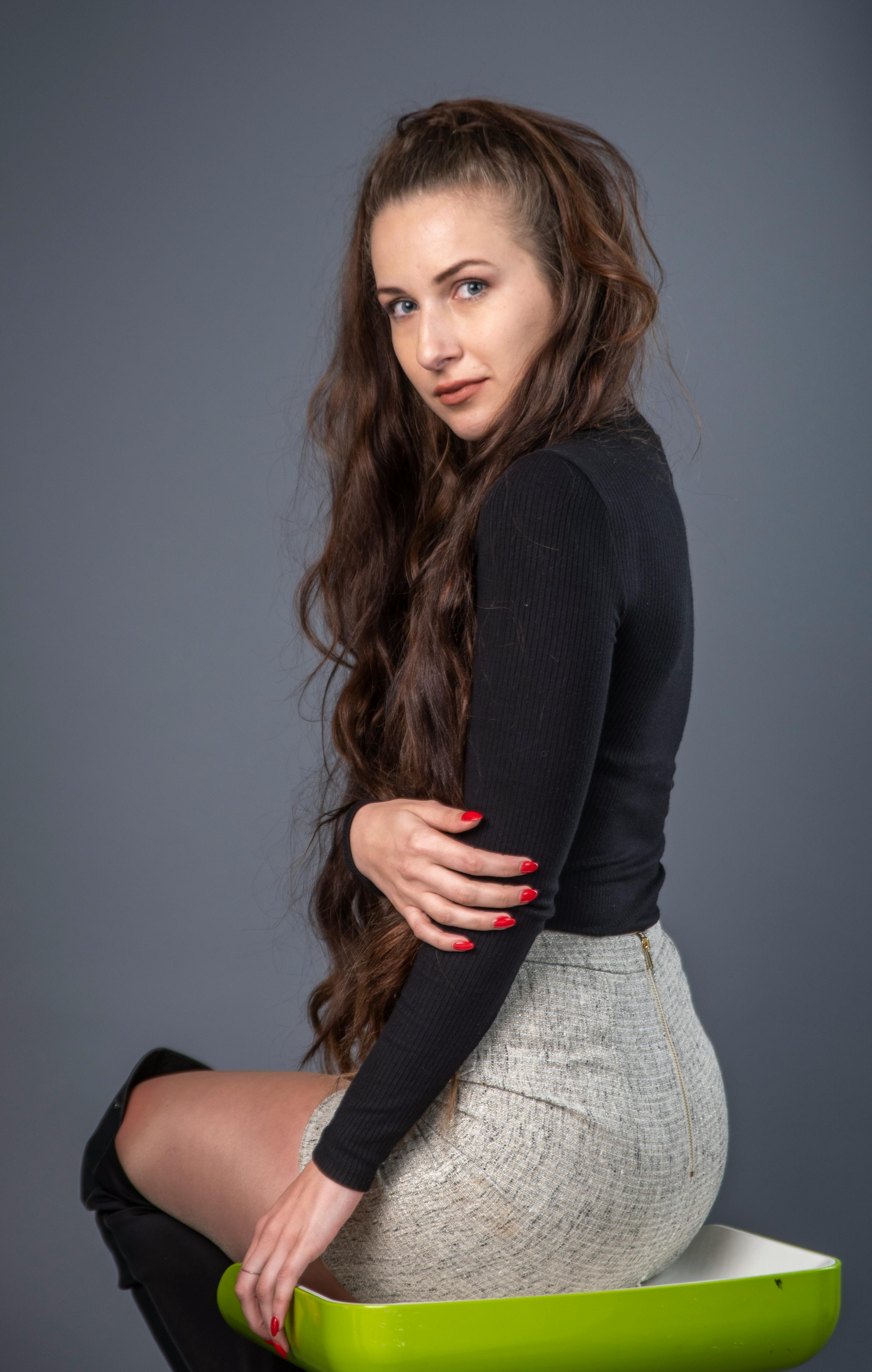 A Woman Sitting on the Chair · Free Stock Photo