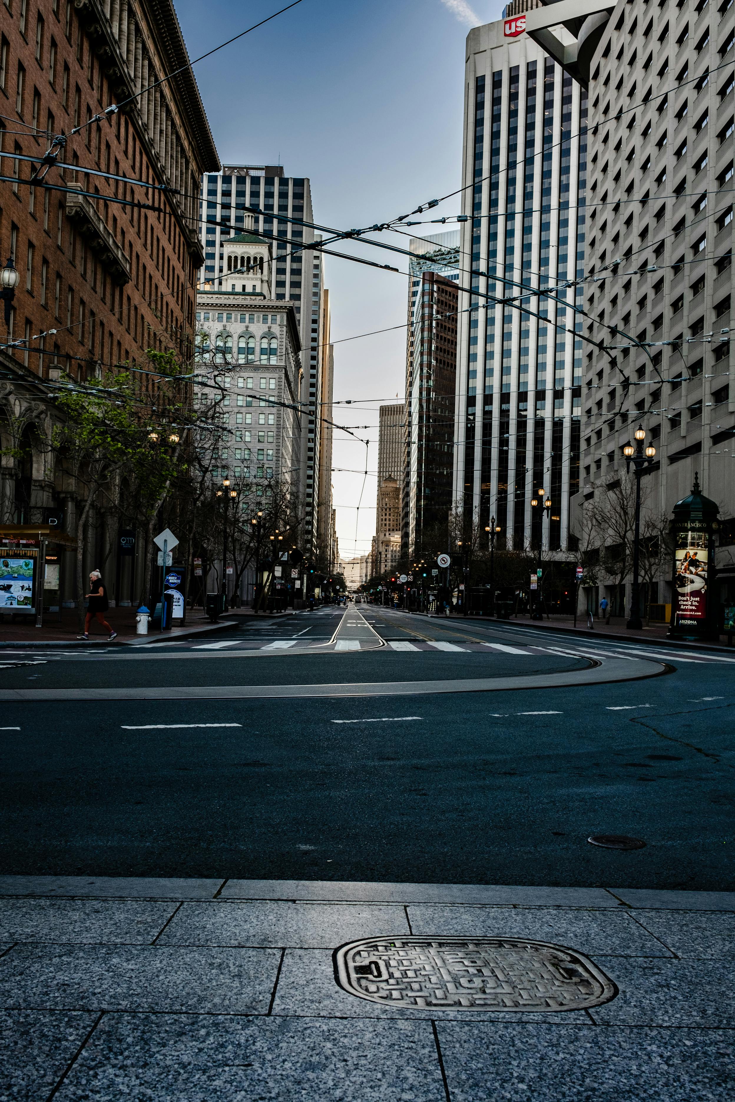 Road in Between High Rise Buildings · Free Stock Photo