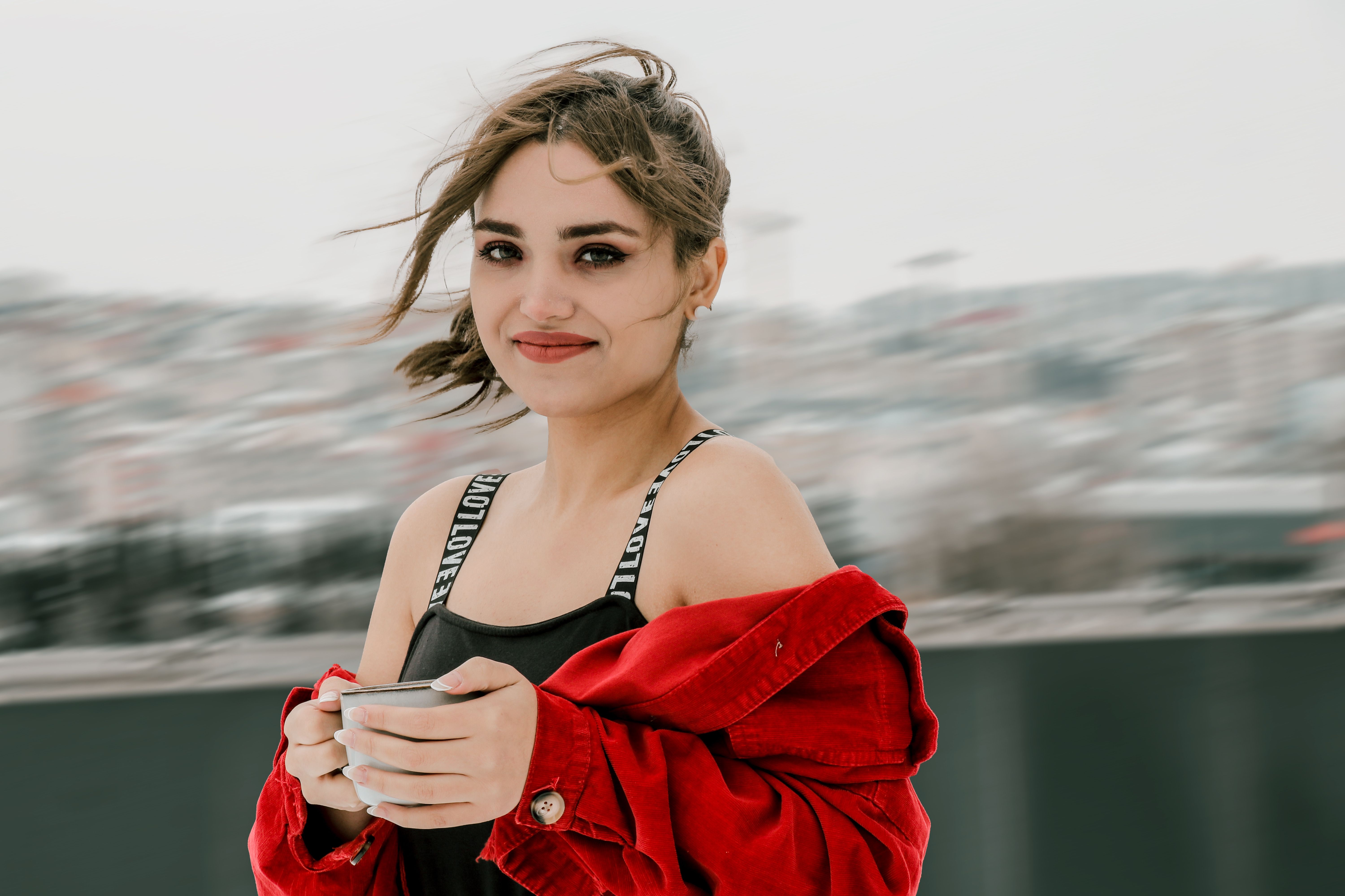 Beautiful Woman Holding a Light Bulb · Free Stock Photo