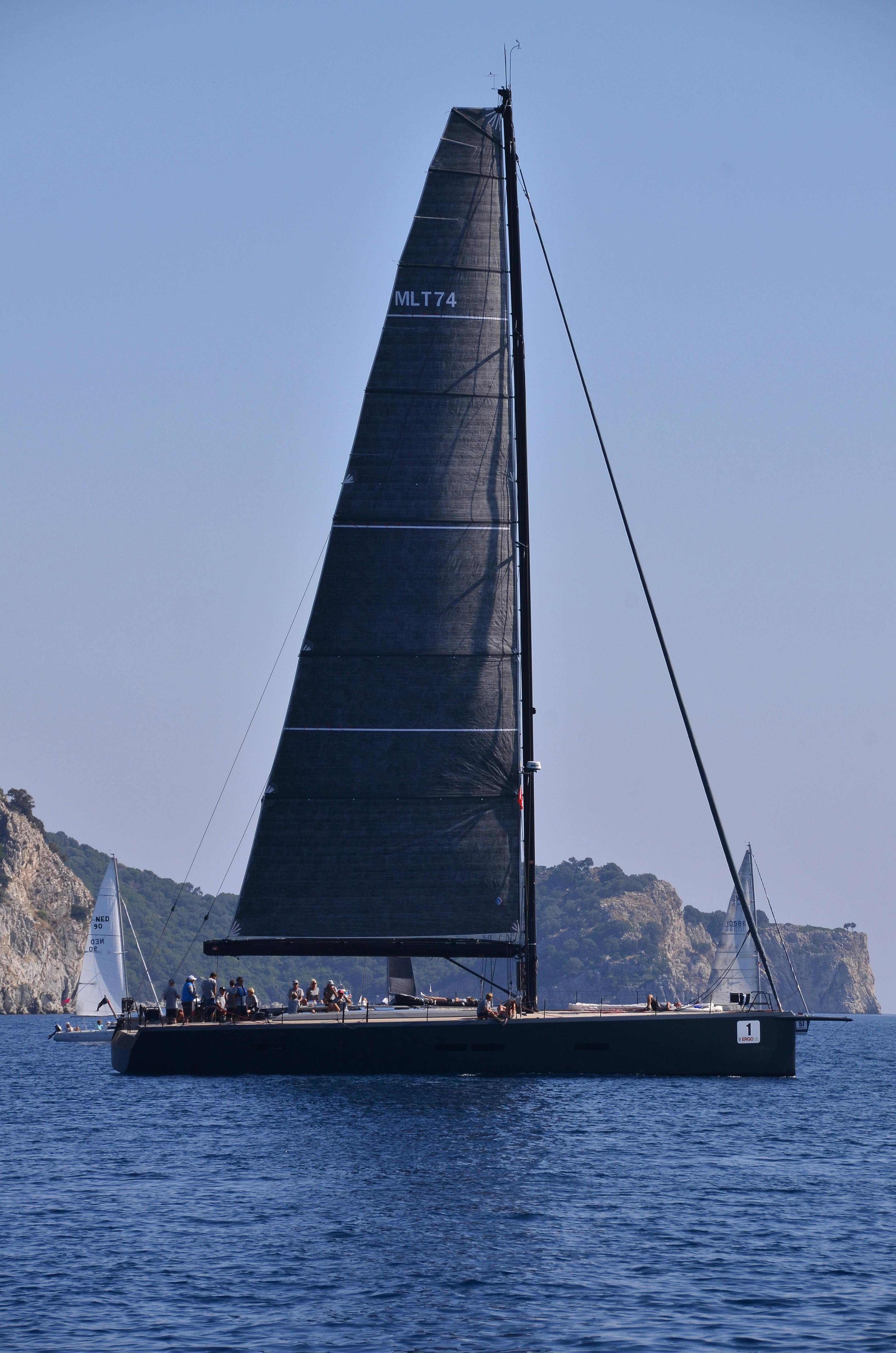 Black Sailboat on the Blue Sea · Free Stock Photo