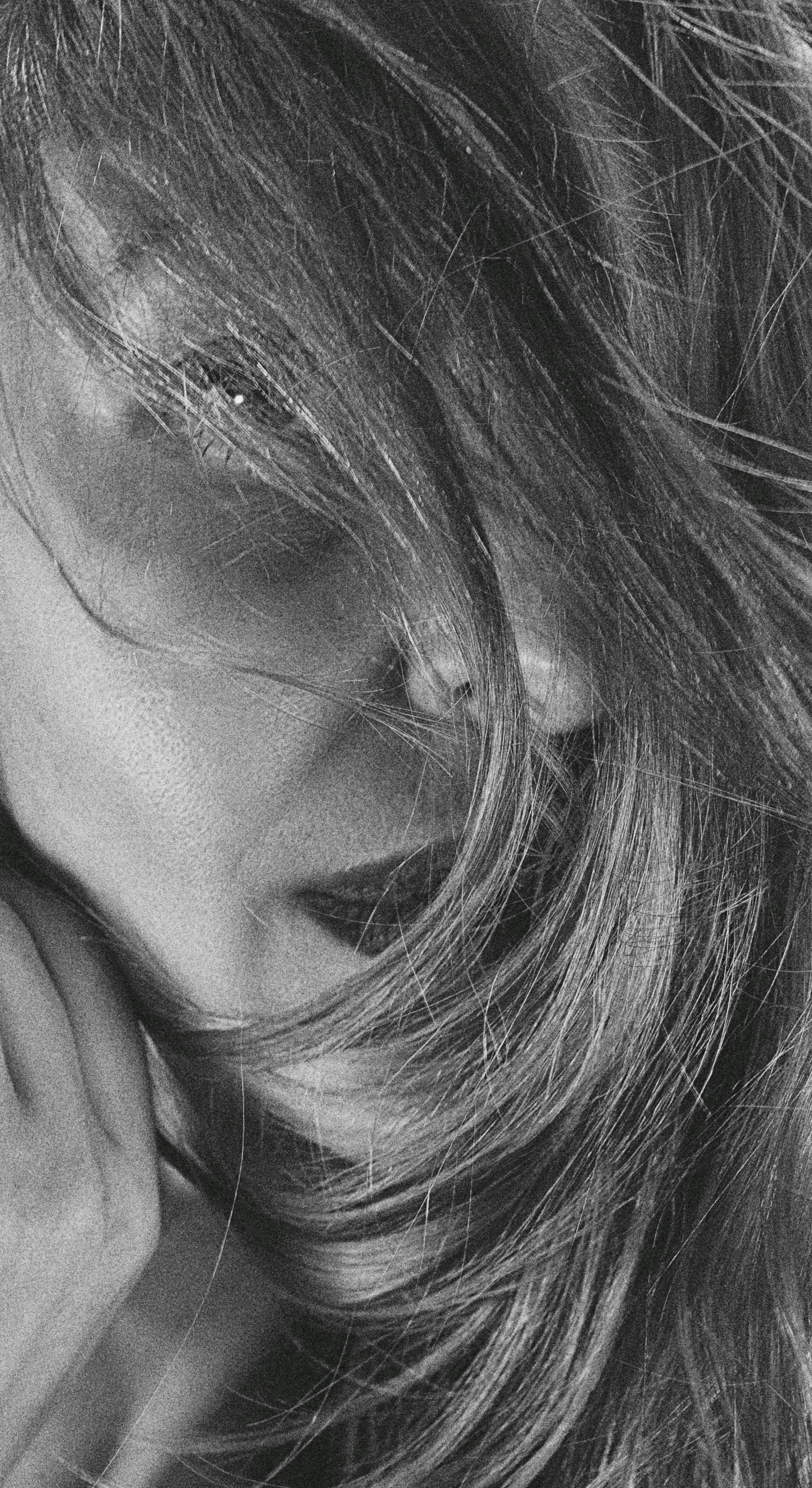 Grayscale Photo of Woman's Face Covered With Hair · Free Stock Photo