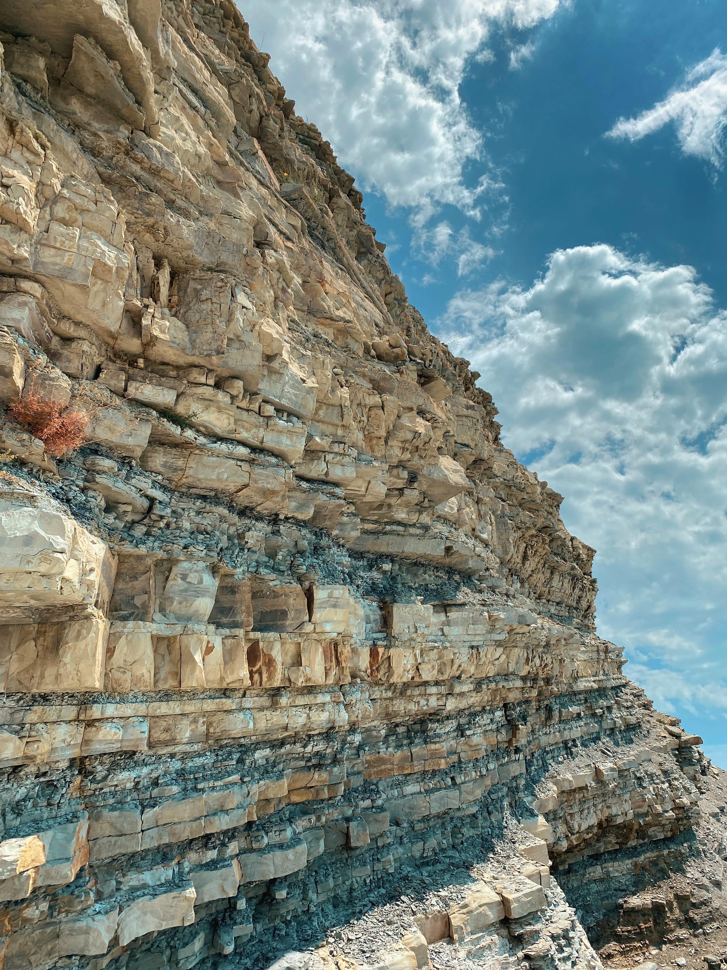 Compressed Rock Layers Formation Under Blue Sky and White Clouds · Free ...