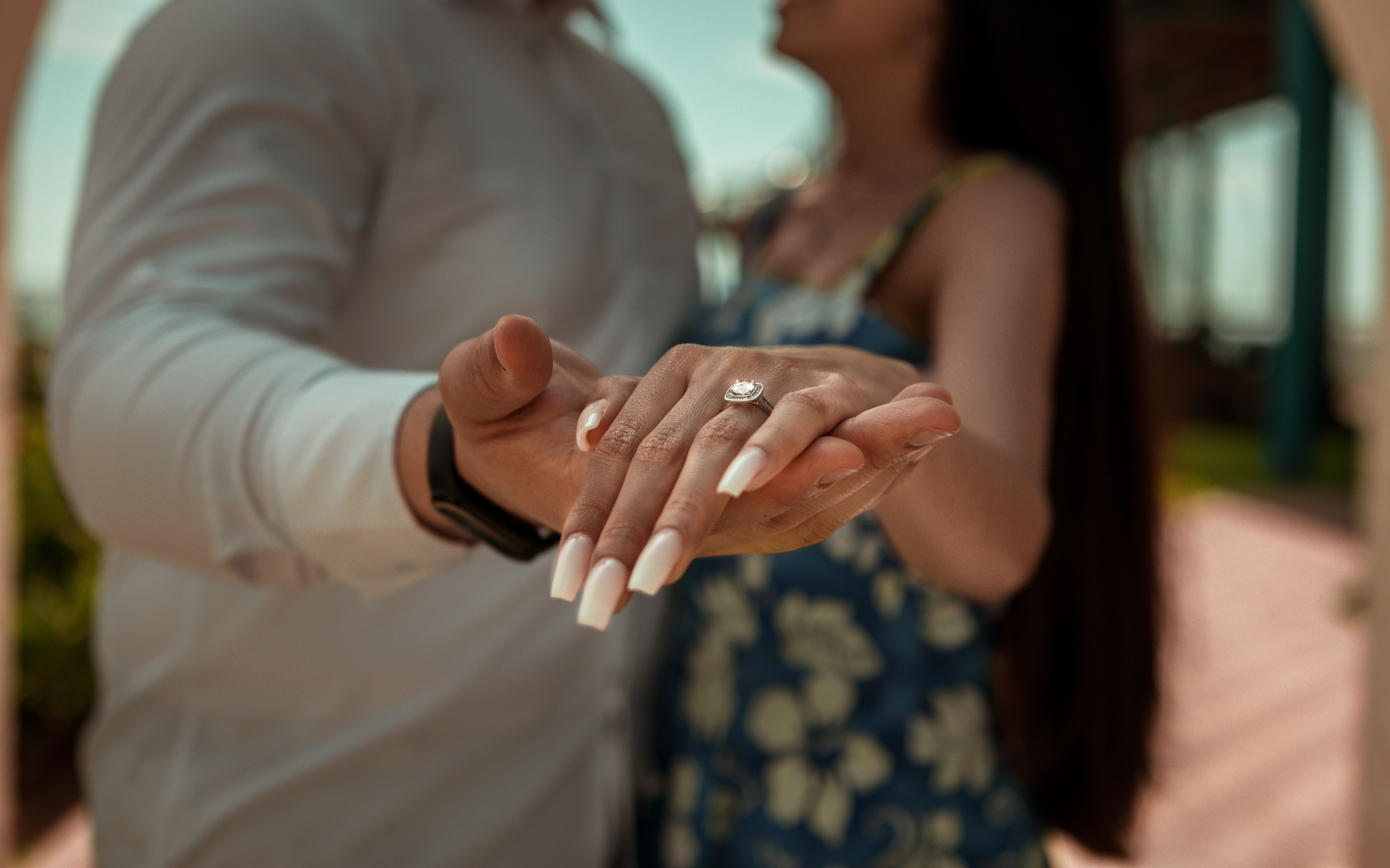 Person Holding a Gold Diamond Ring · Free Stock Photo