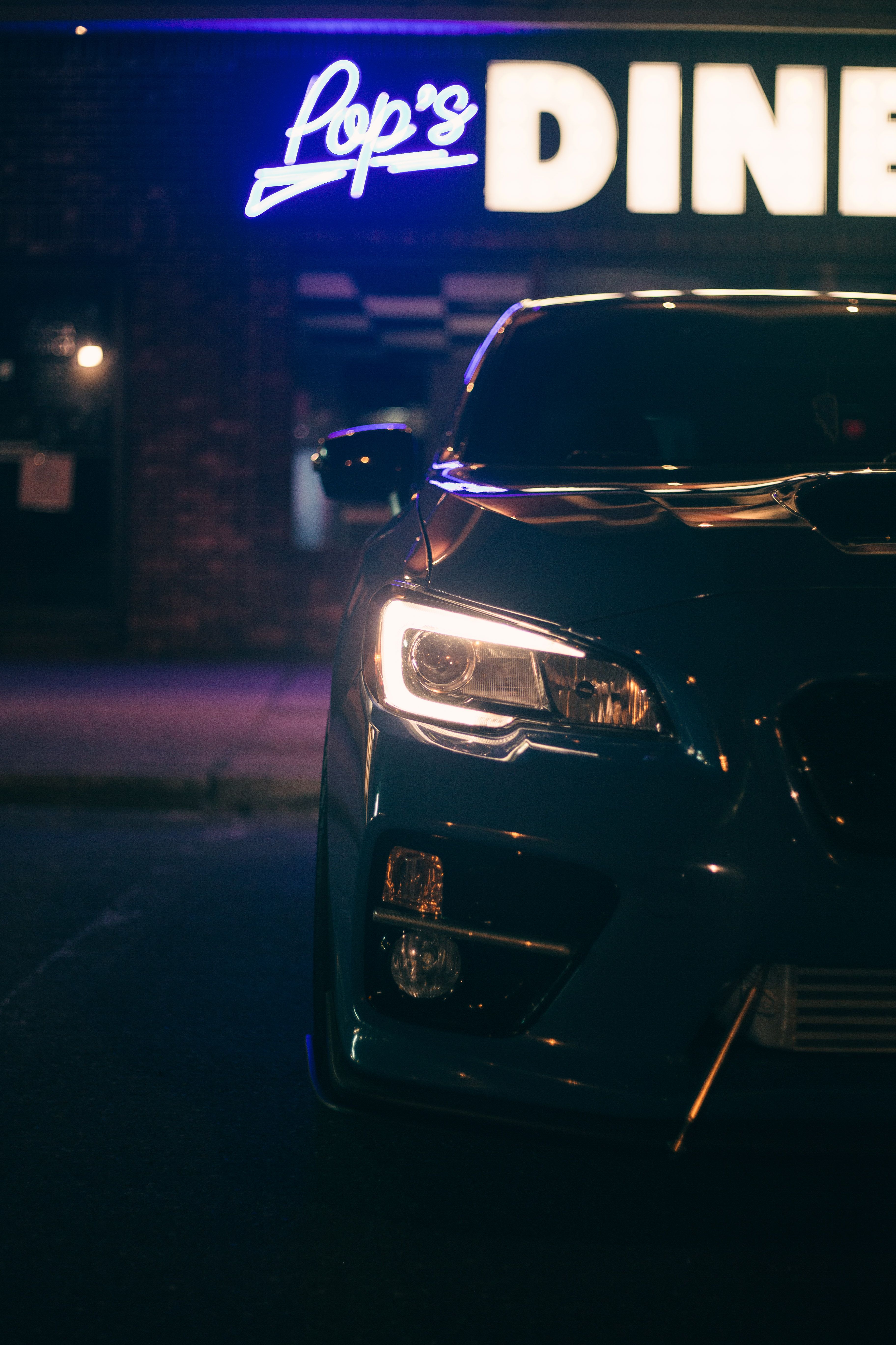 Headlight of a Car During Night Time · Free Stock Photo