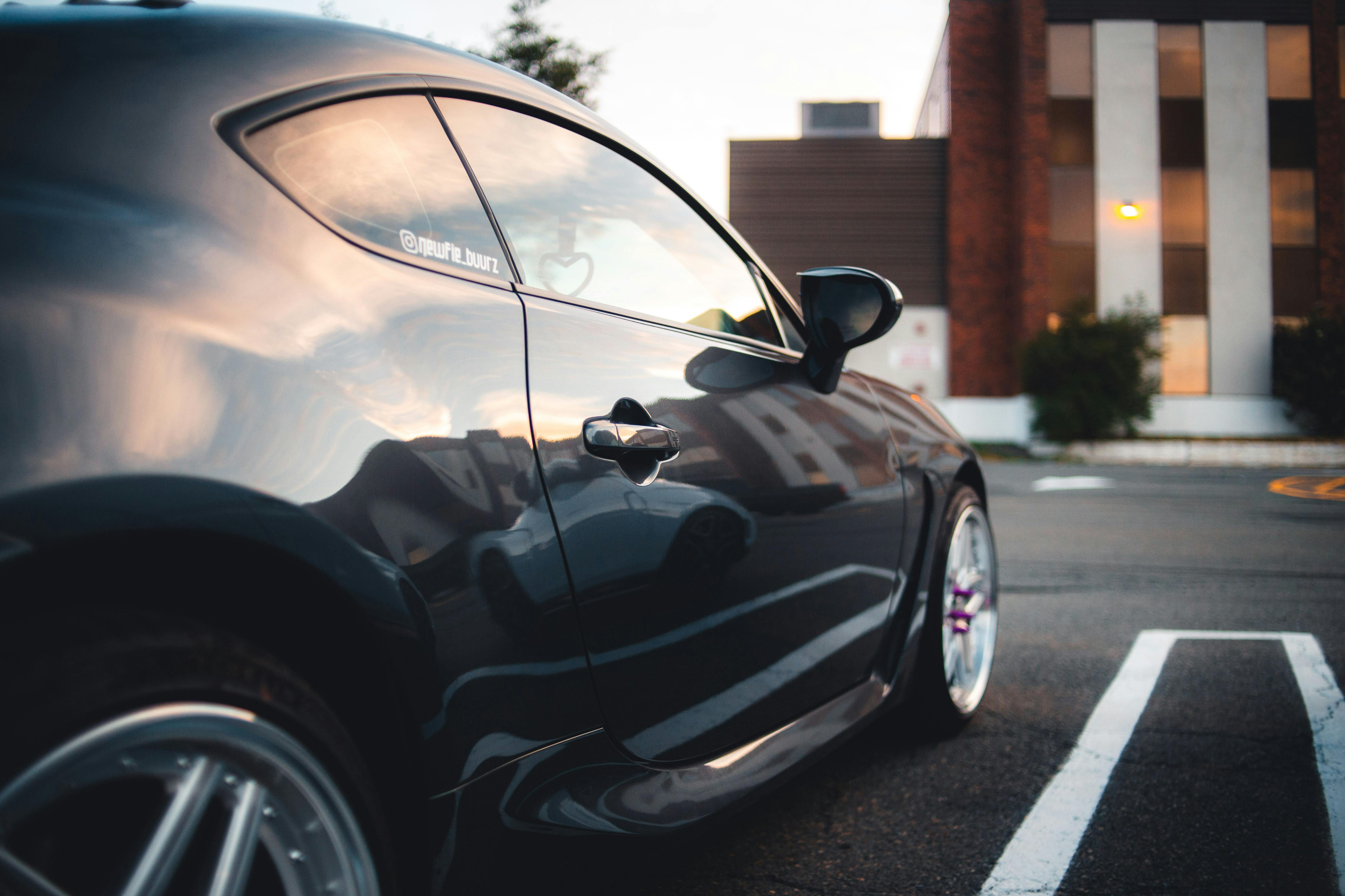 Black Convertible Car on a Parking Lot · Free Stock Photo