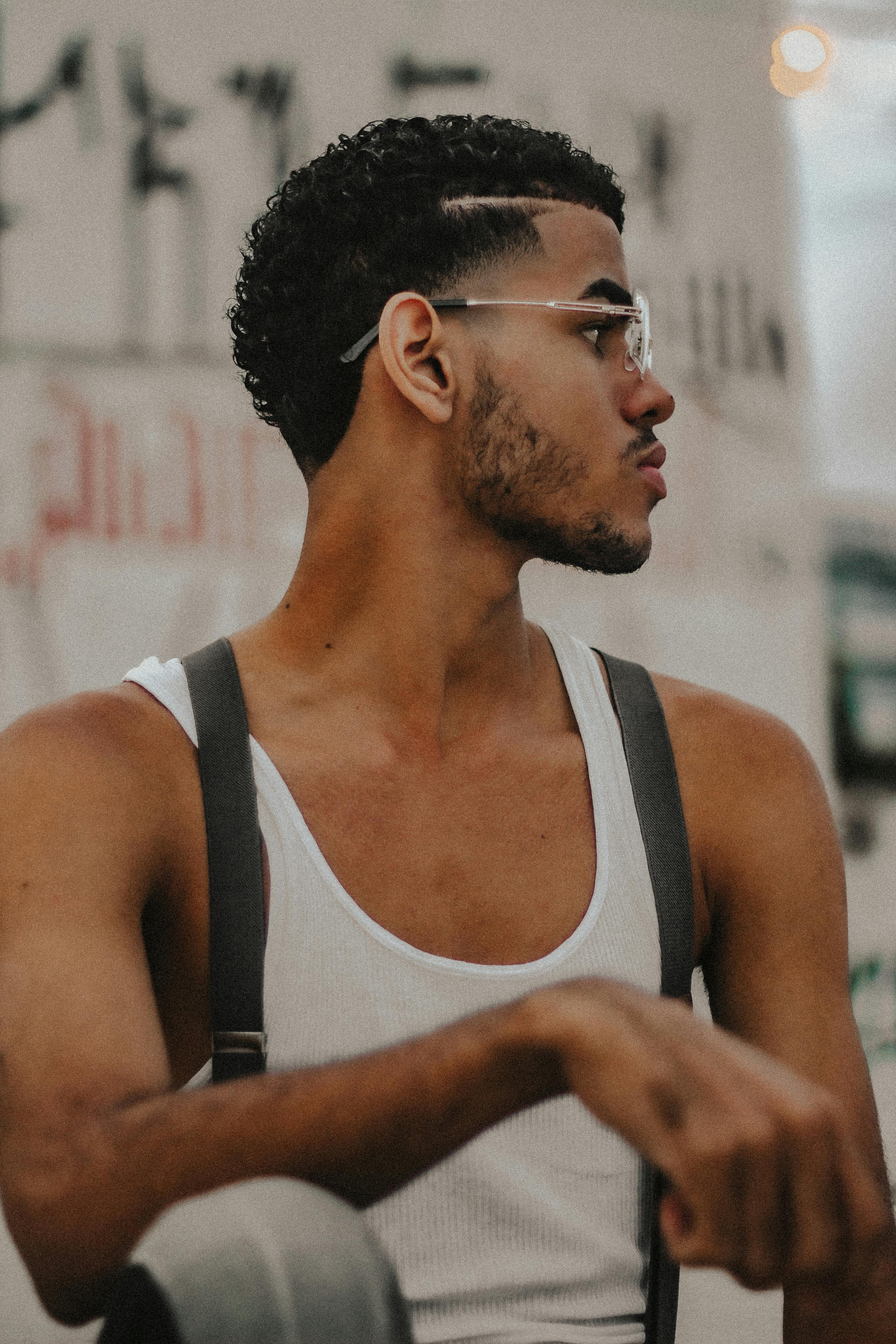 Man Wearing Eyeglasses Looking Sideways · Free Stock Photo