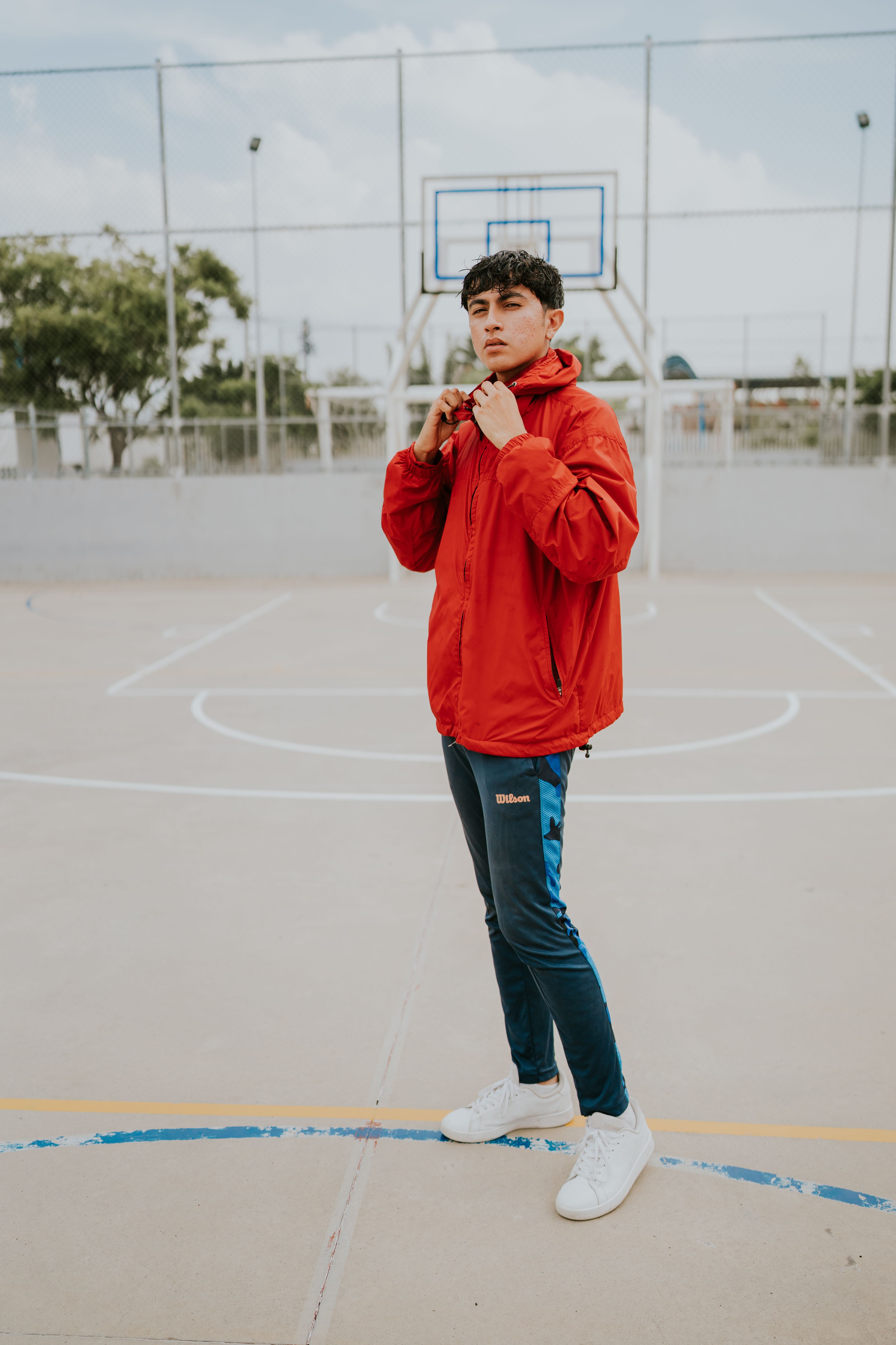 Photo of Man in Yellow Long-sleeved Sweatshirt Standing Outdoor · Free ...
