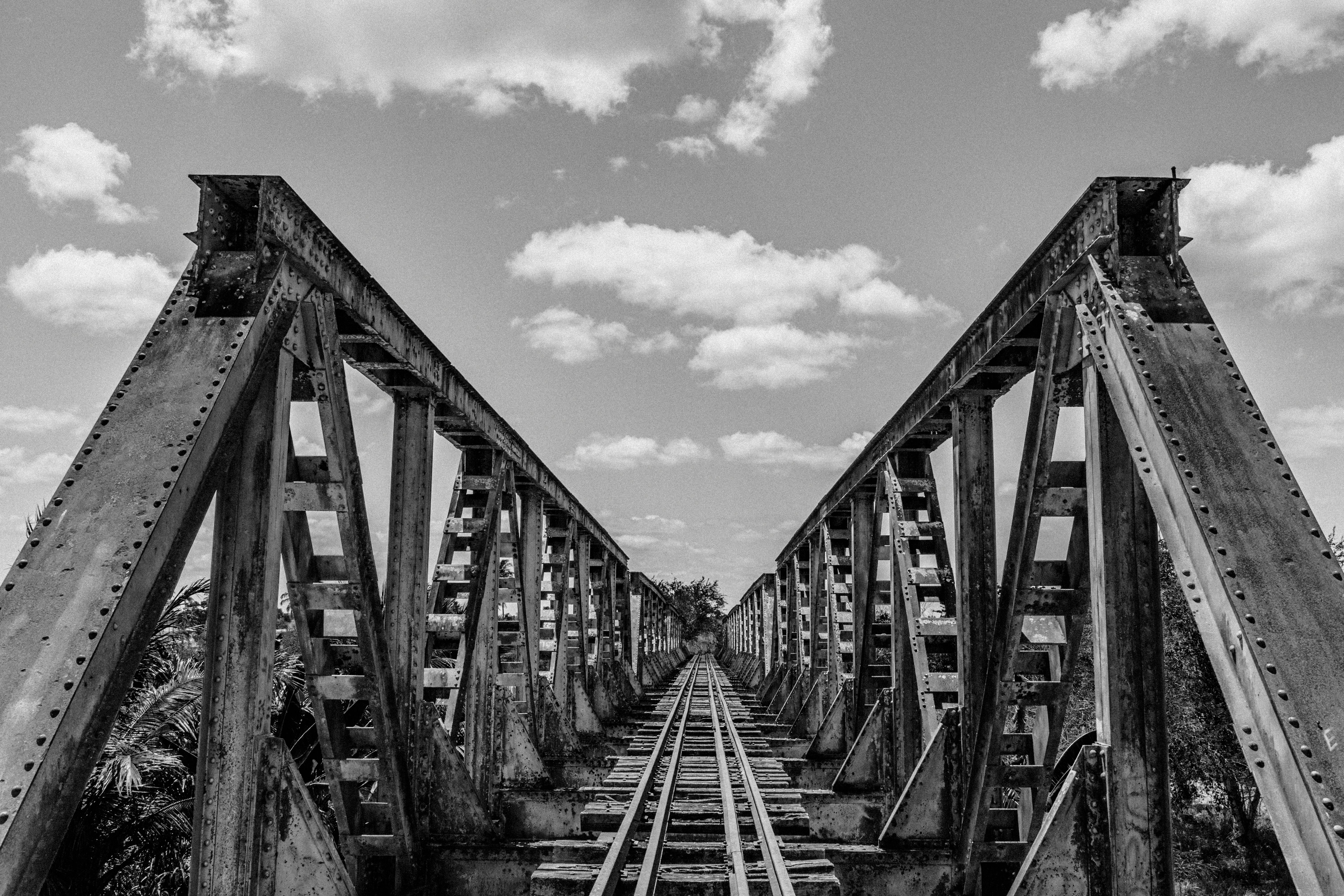 A Grayscale of a Train Track · Free Stock Photo