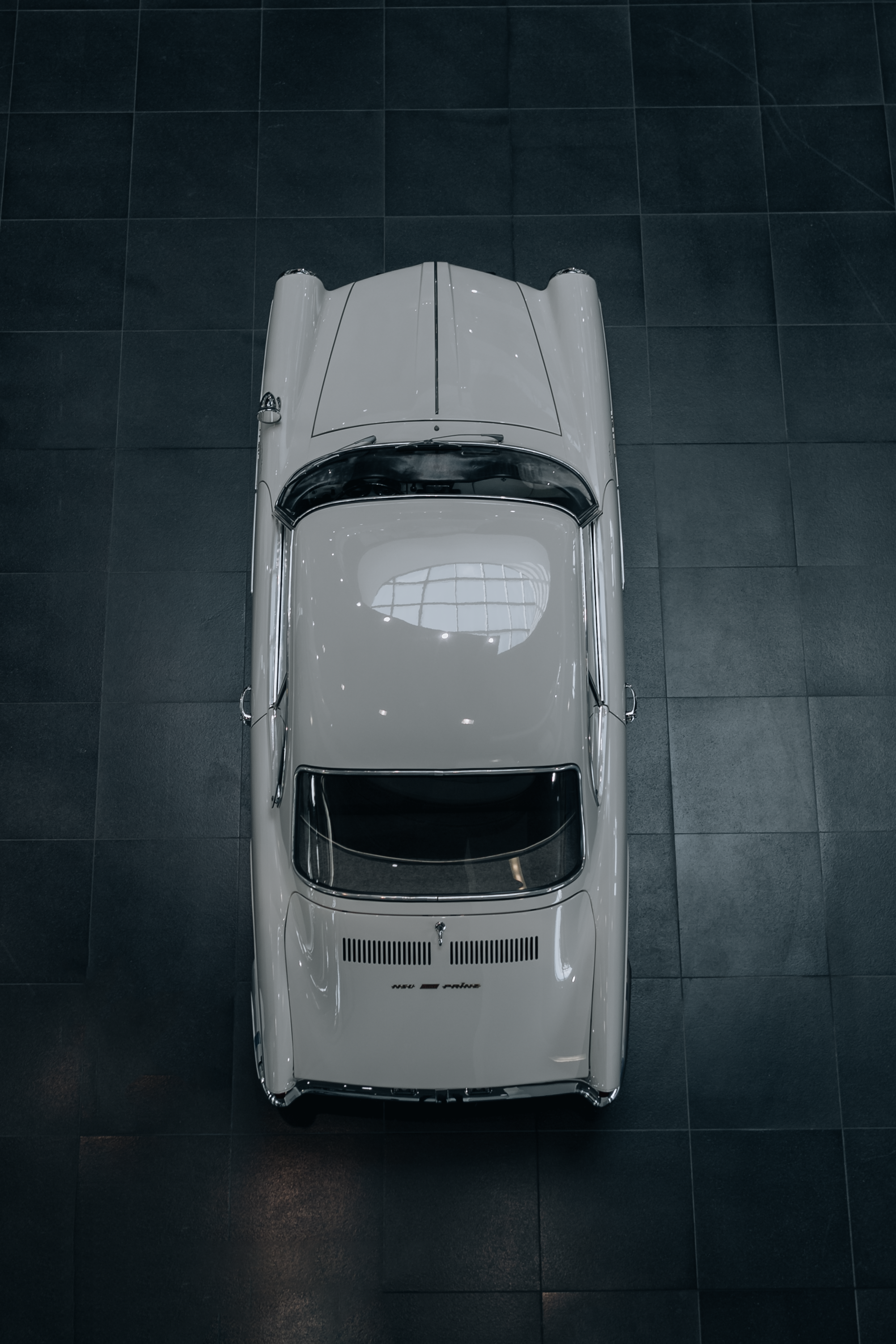 High Angle Shot of a White Classic Car · Free Stock Photo