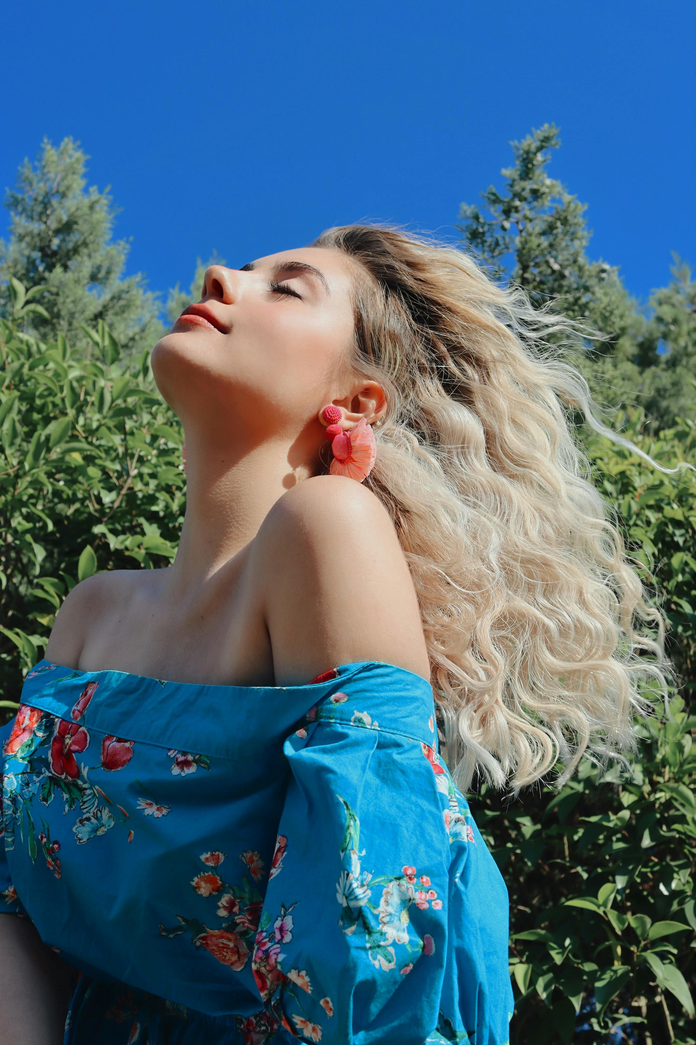 Beautiful Woman in Blue Floral Dress · Free Stock Photo
