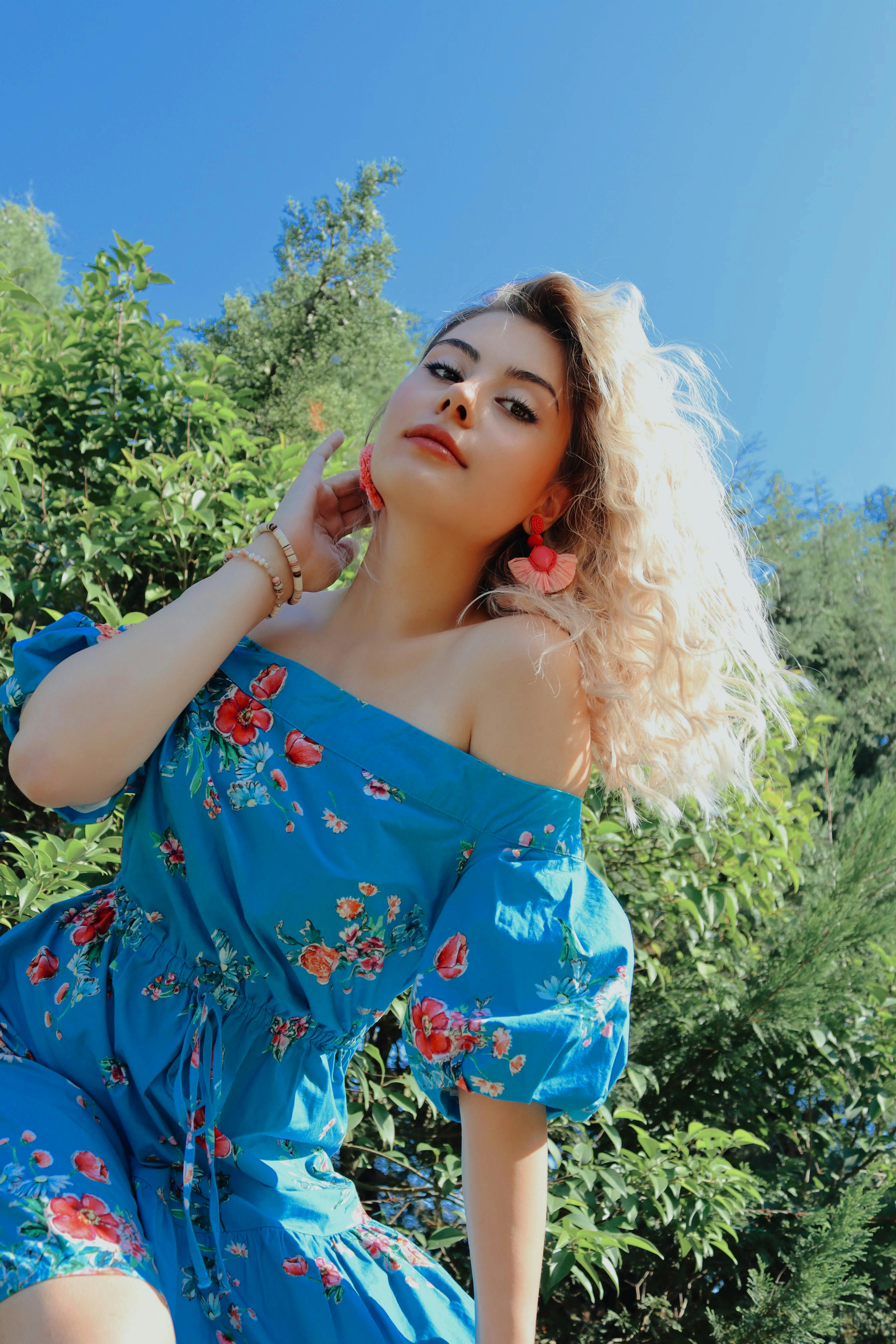 Woman In Blue Off Shoulder Dress Standing Beside The Railings · Free