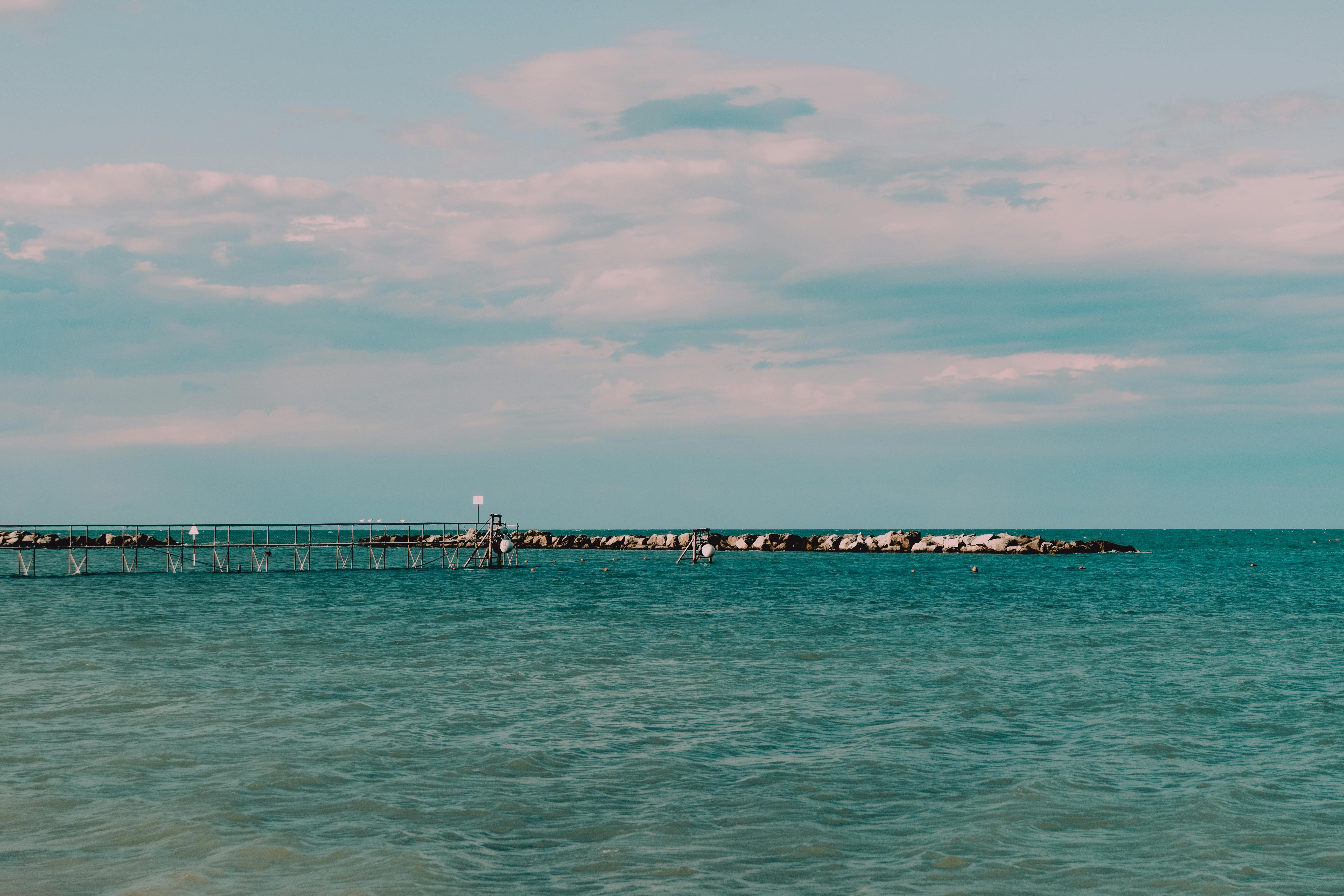 Dock on Ocean under Cloudy Sky · Free Stock Photo