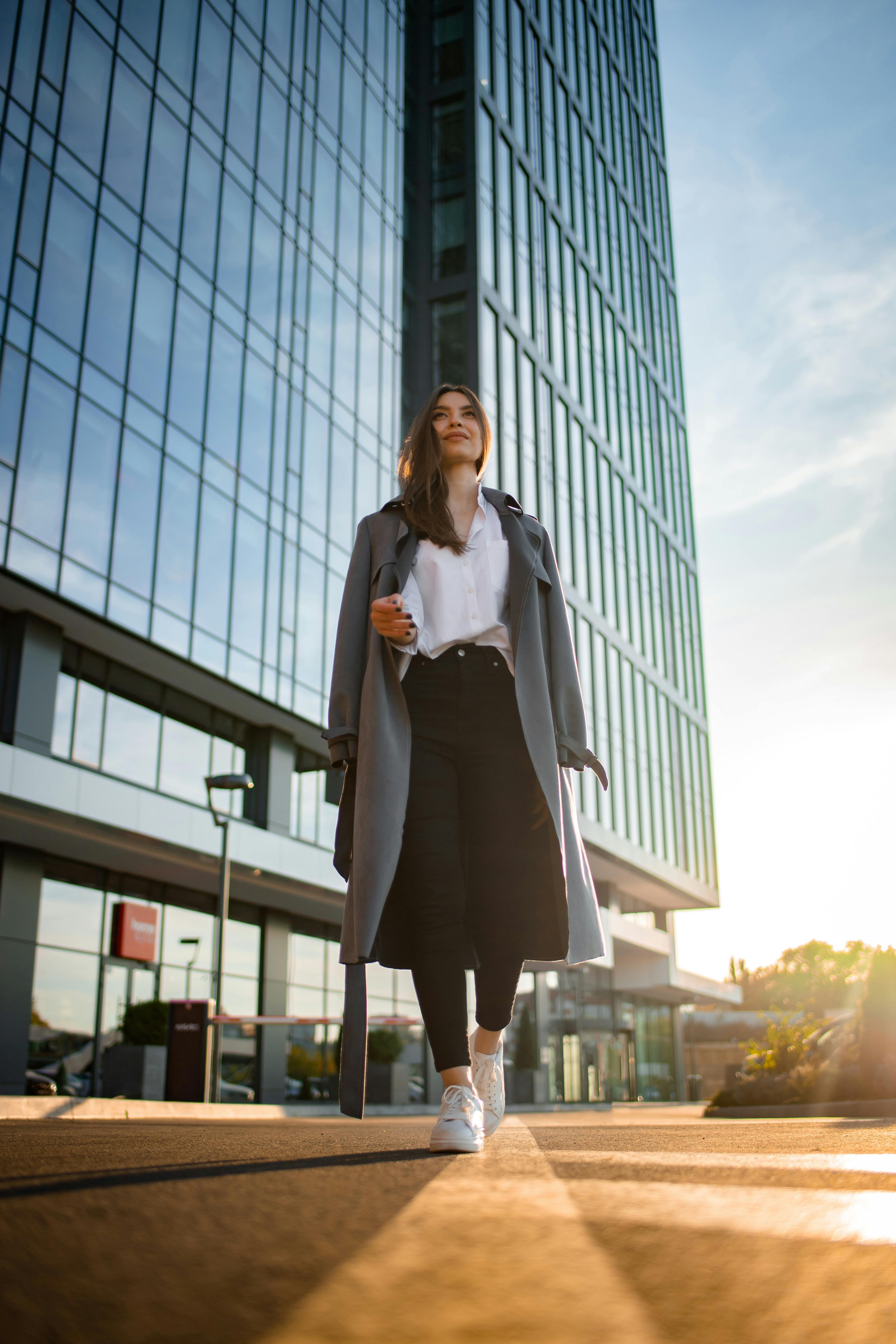Low-Angle Shot of a Woman Walking · Free Stock Photo