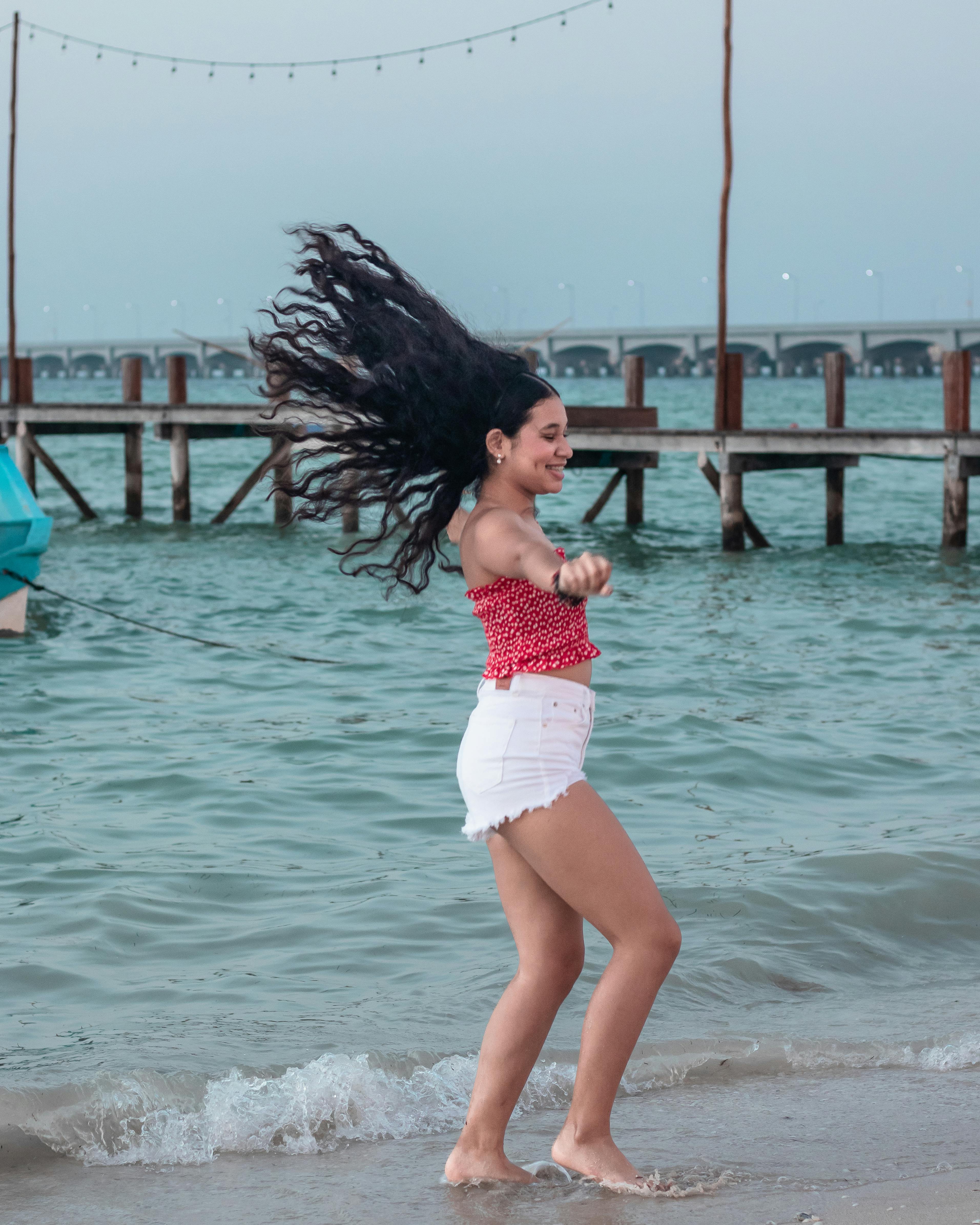 A Woman with Black Hair Dancing · Free Stock Photo
