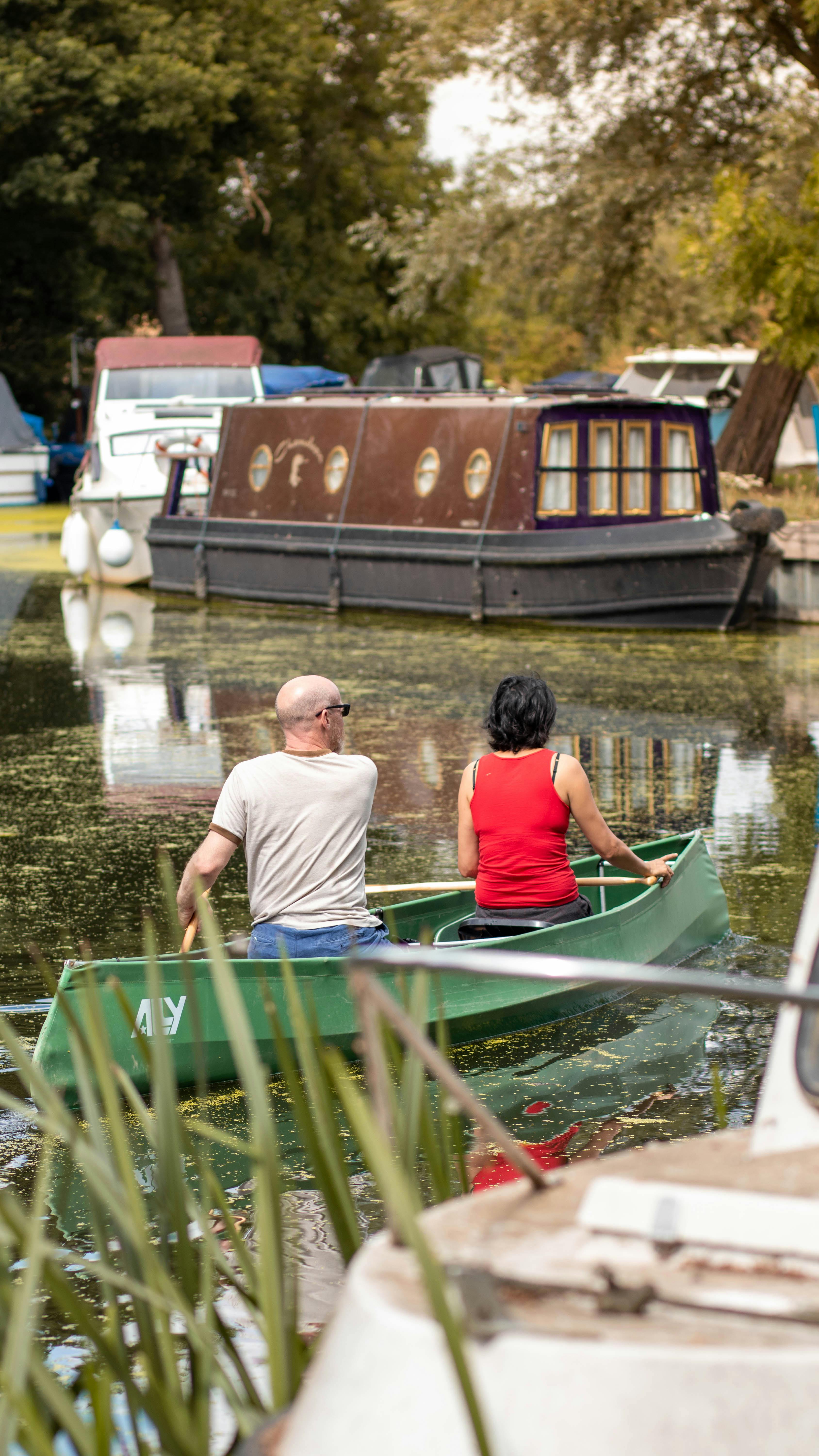People Riding Boats on a River · Free Stock Photo