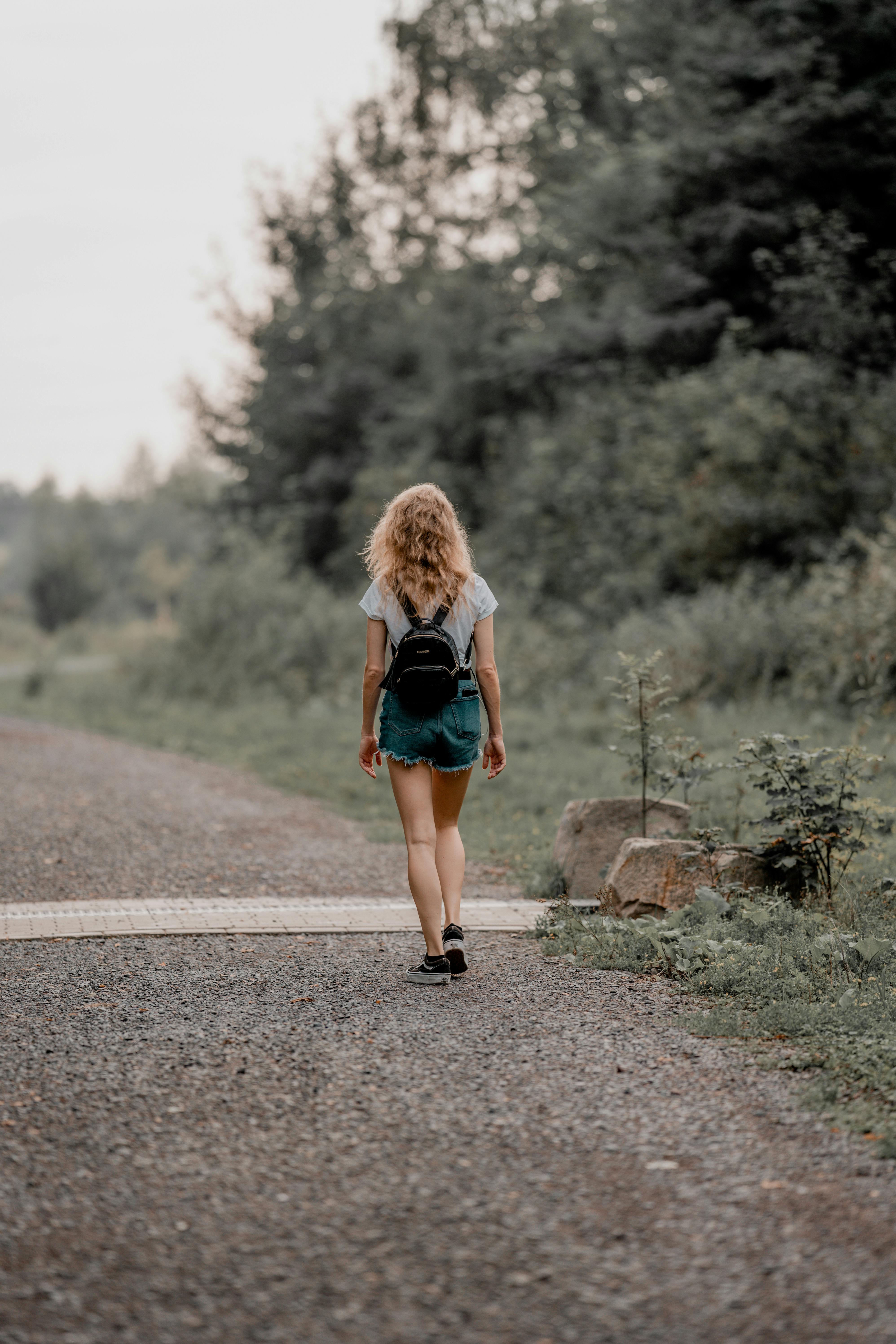 Back View of a Girl Walking · Free Stock Photo