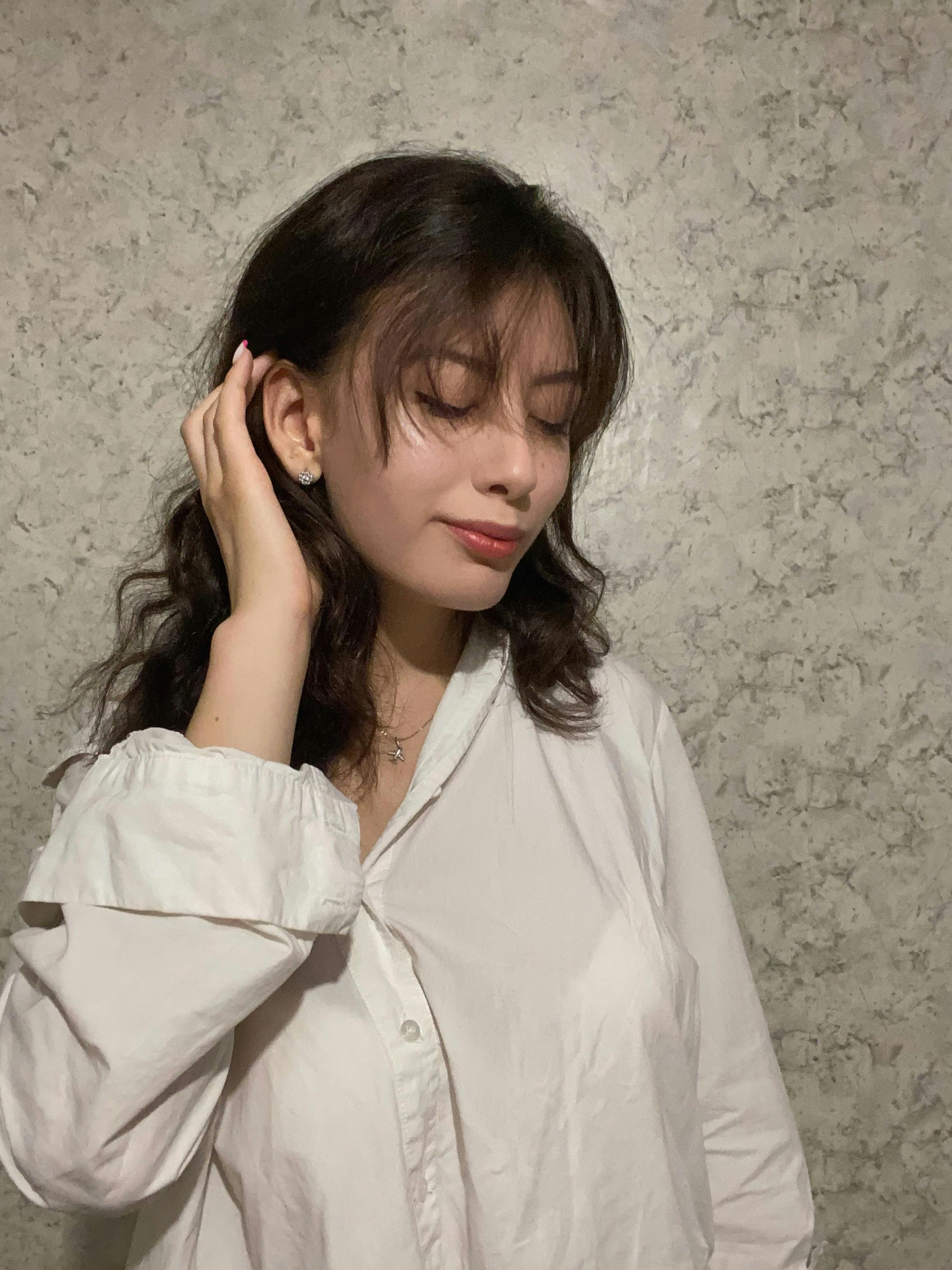 Pretty Woman Fixing Her Hair · Free Stock Photo