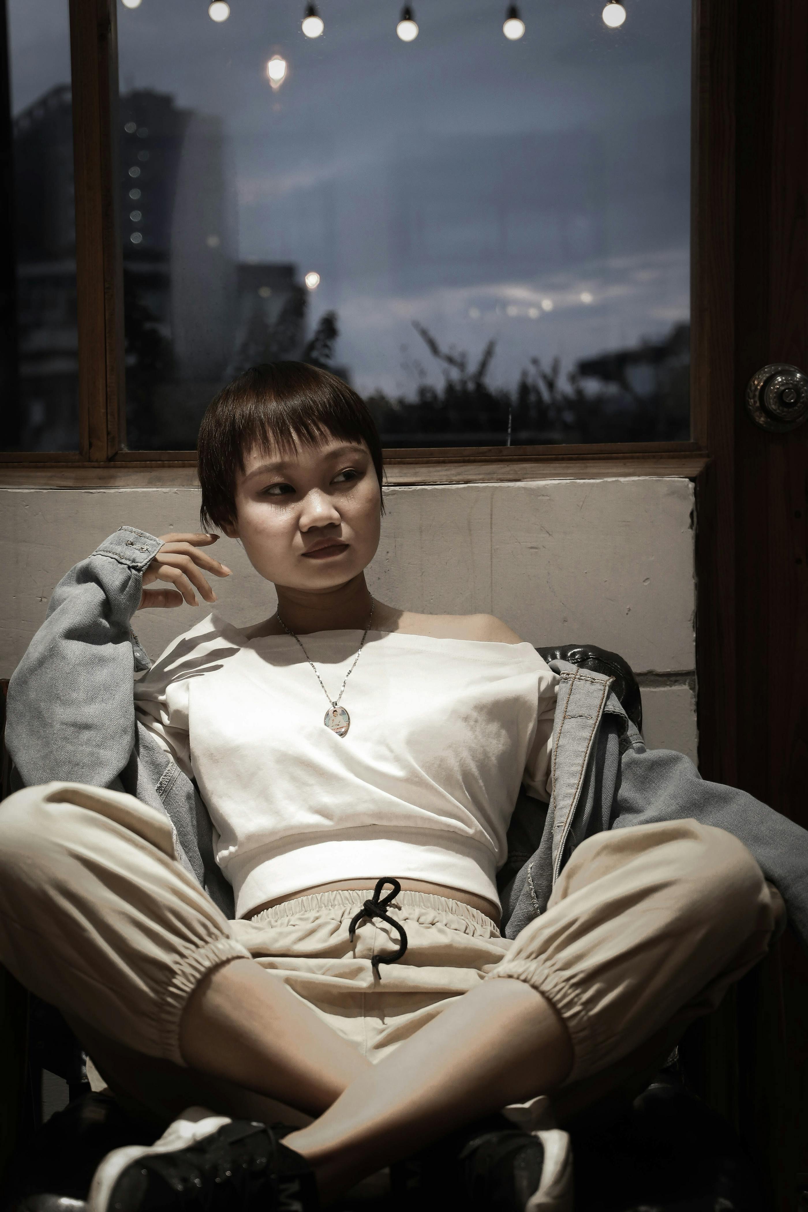 Girl Sitting on the Poolside · Free Stock Photo