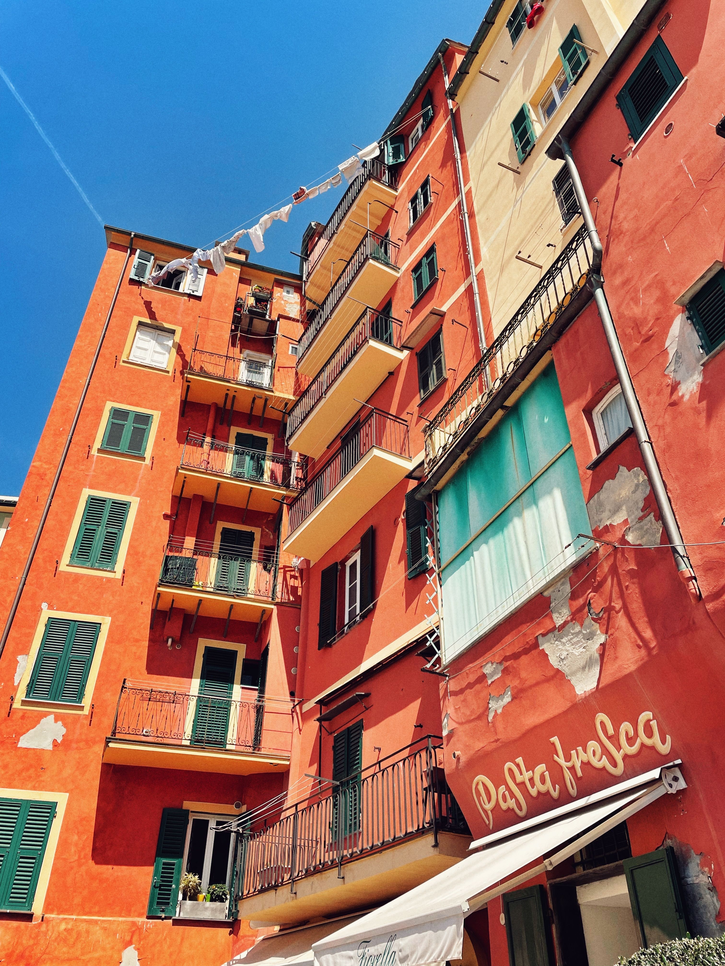 Photo of a Red Apartment Building · Free Stock Photo