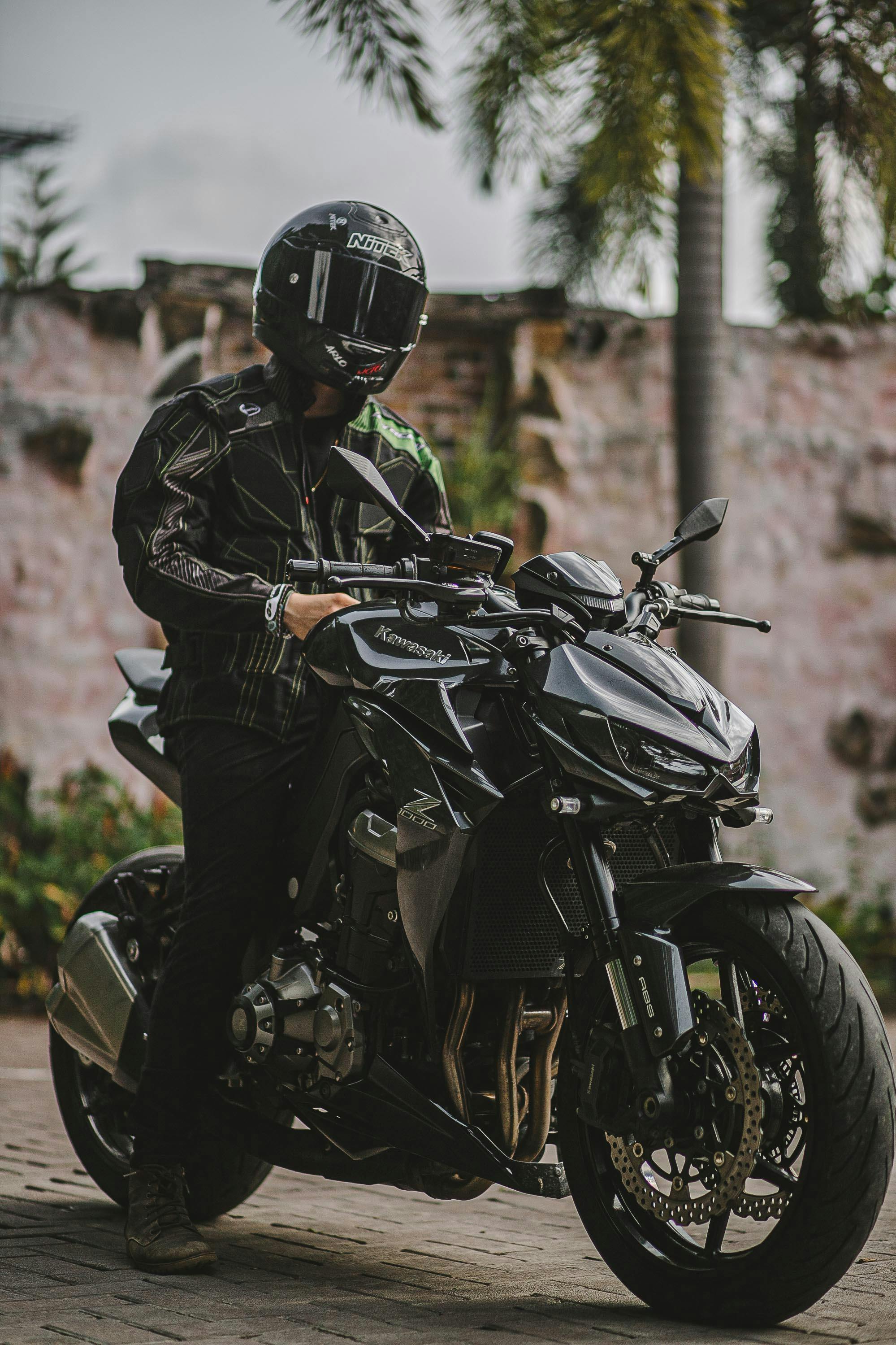 Person Wearing White Helmet Riding on Motorcycle · Free Stock Photo
